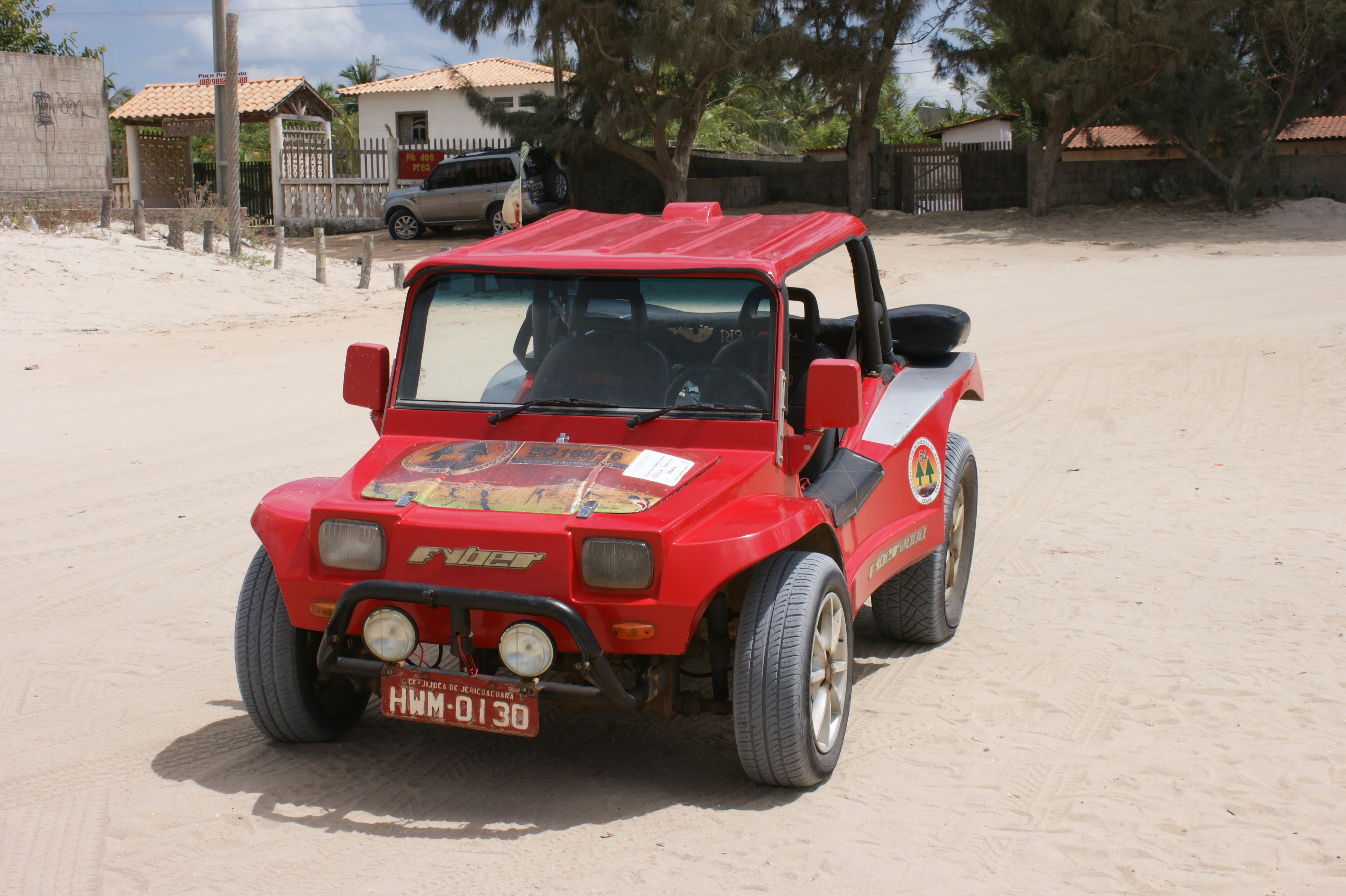Vibrant Off-Roader on Coastal Sands