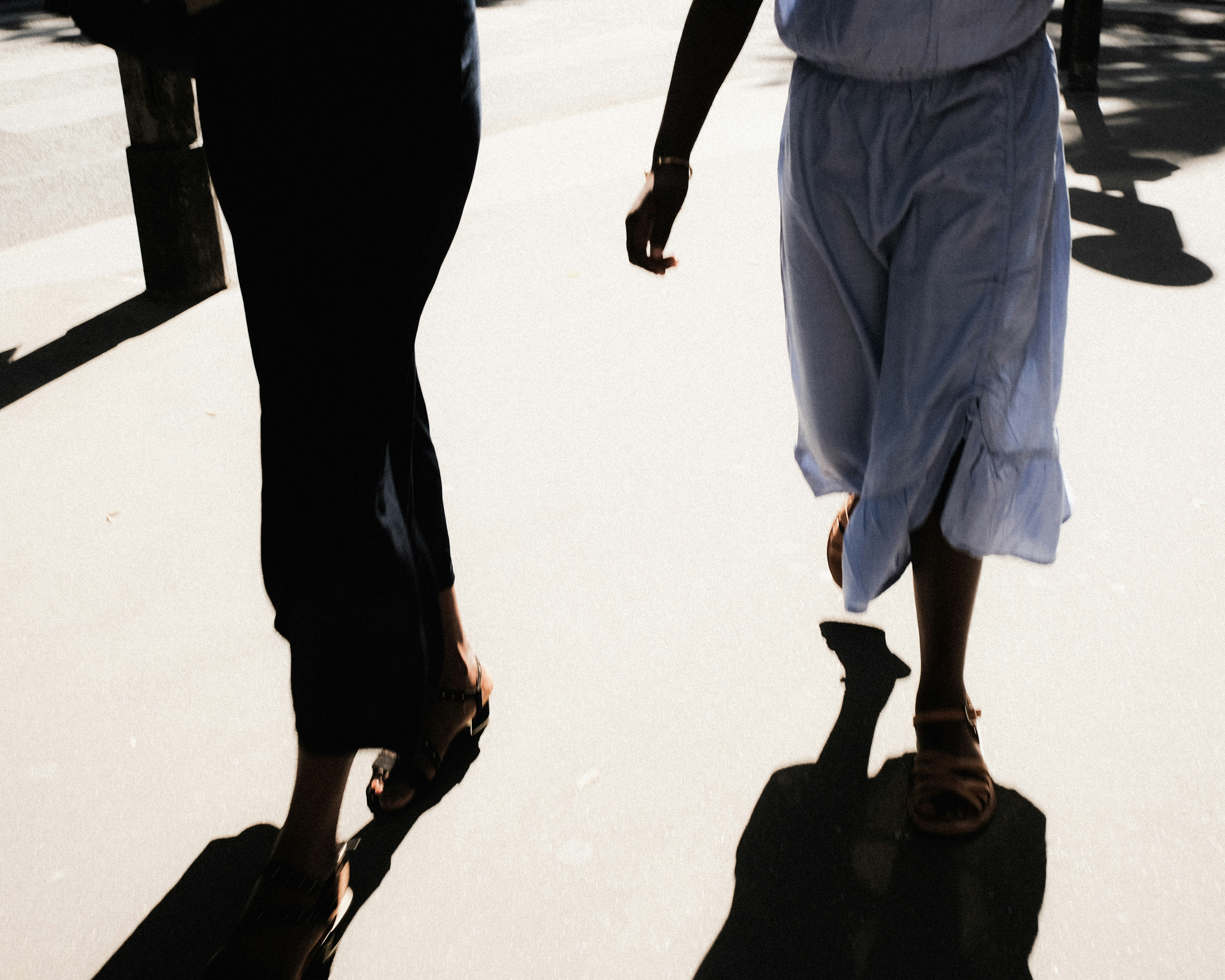 Shadowed Footfalls on a Blazing Avenue