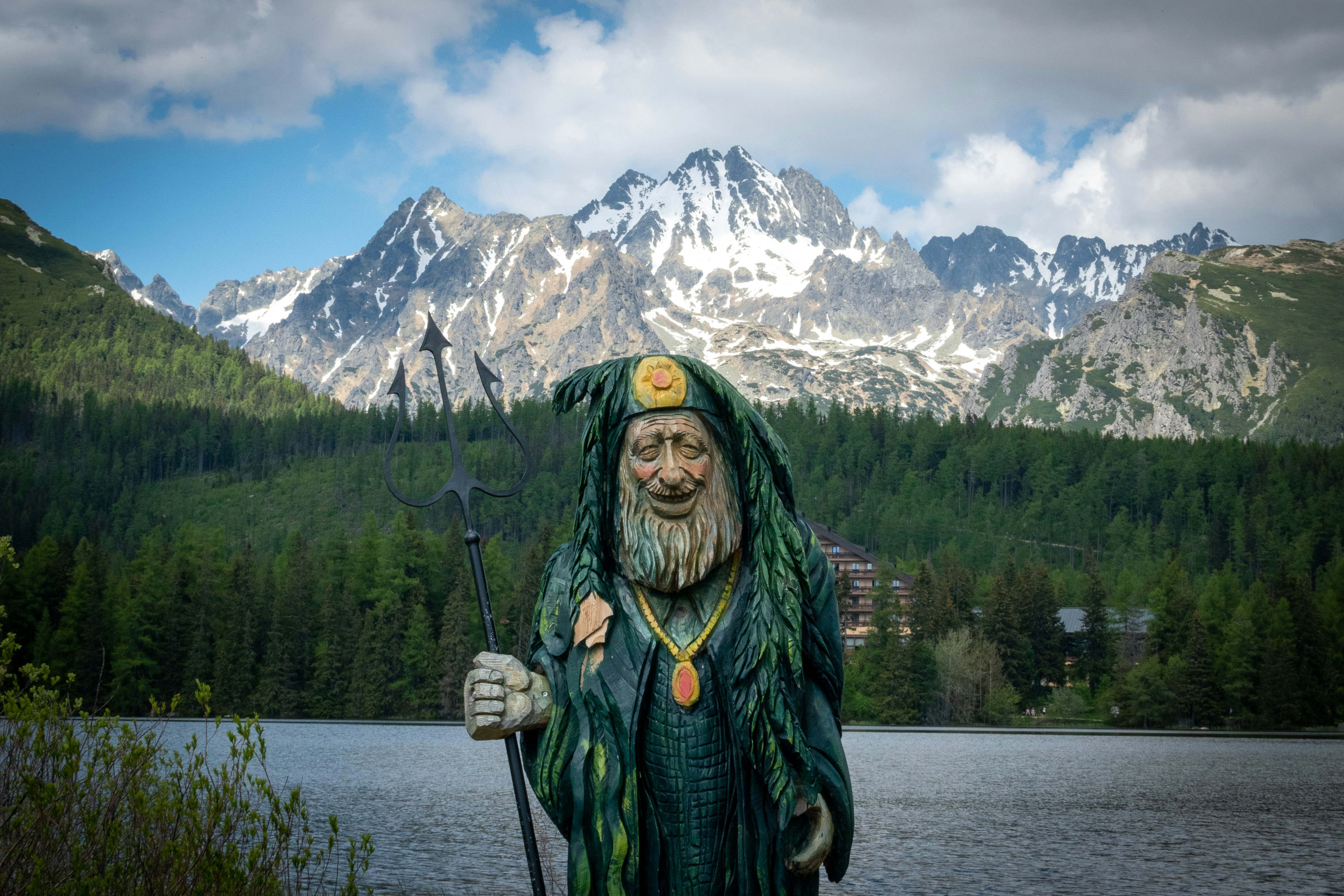 A man wearing a scarf and holding a bow and arrow photo – Free Slovakia ...
