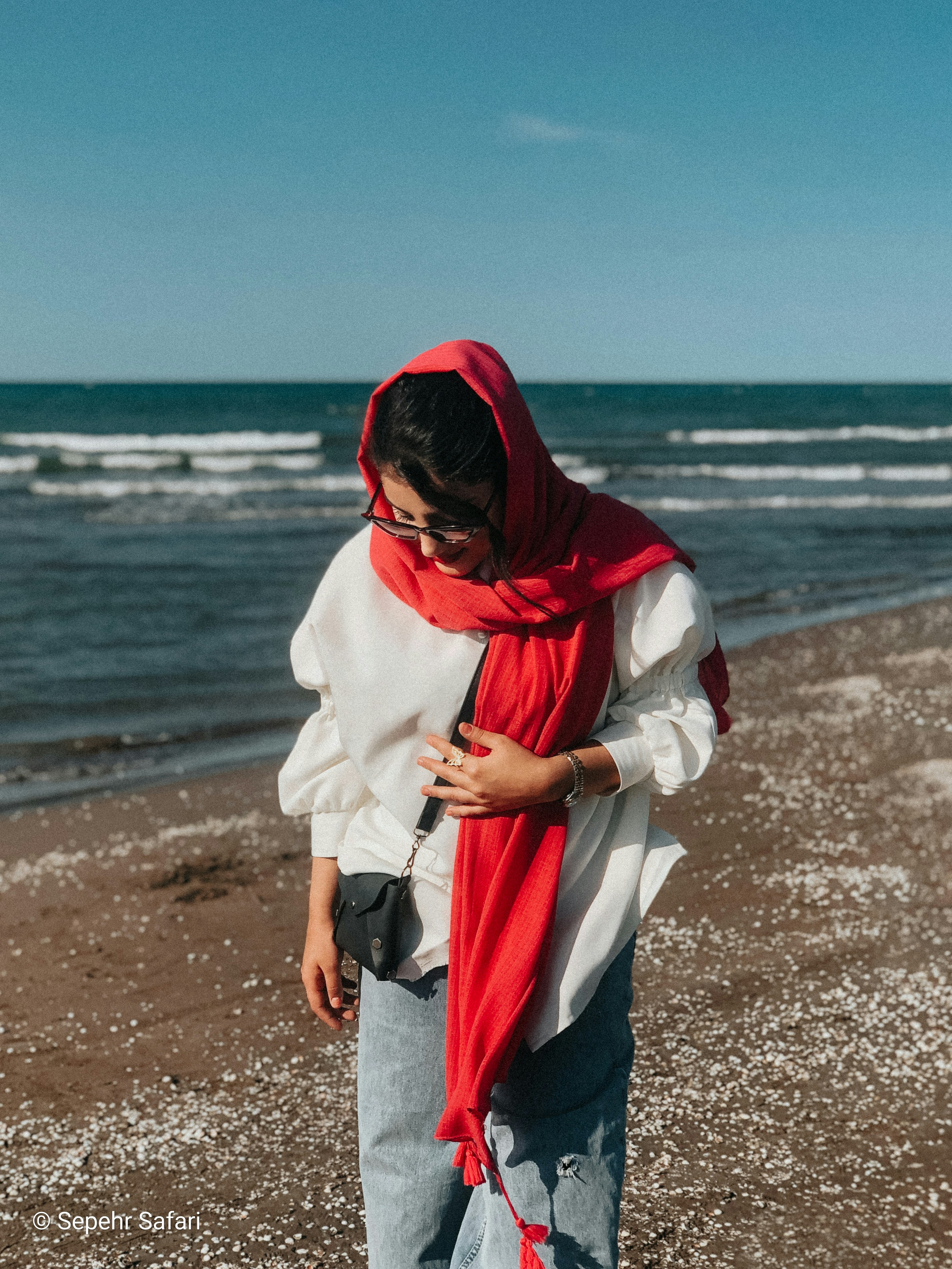 Red Scarf on the Seaside: A Quiet Moment by the Shore