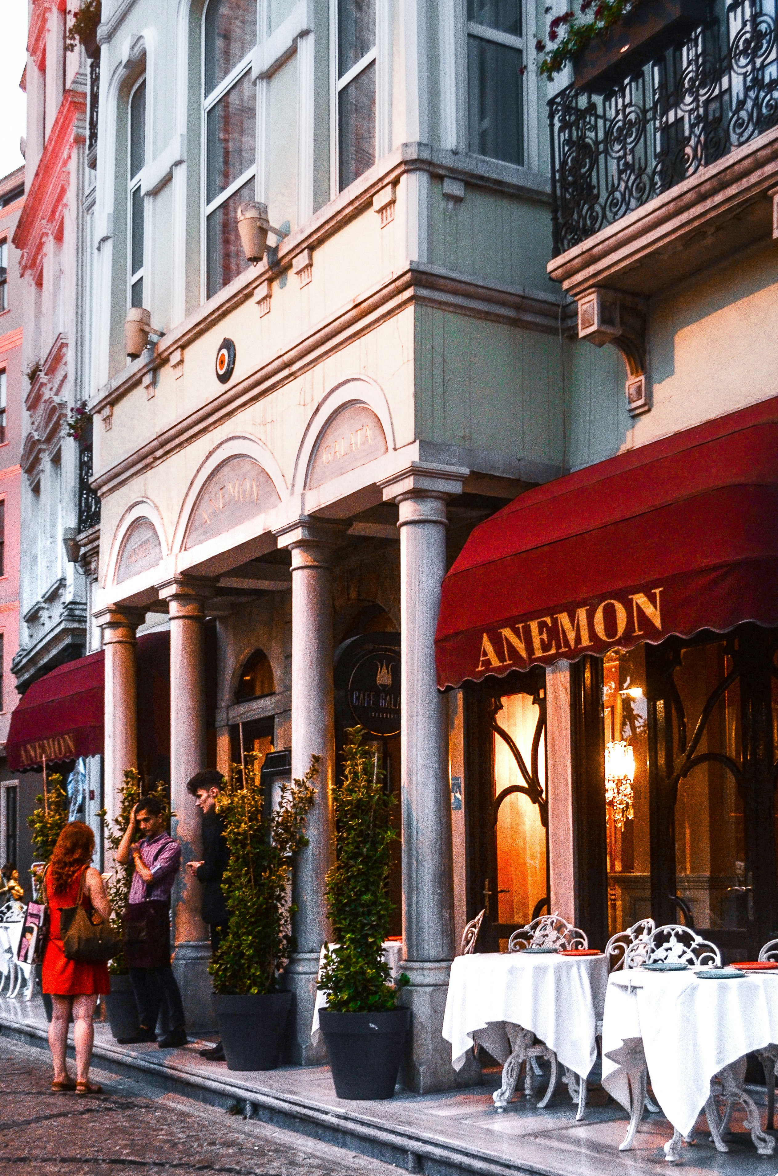 A group of people outside a building photo – Free Person Image on Unsplash