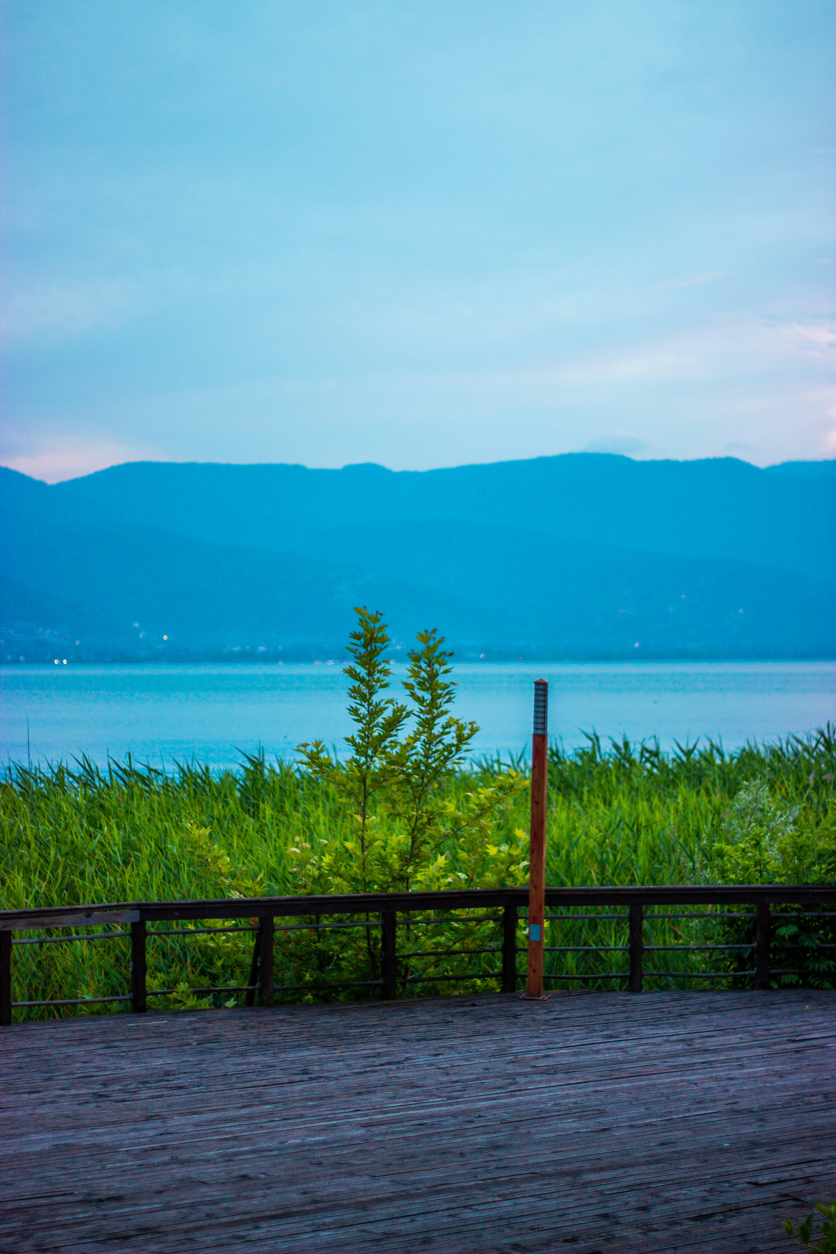 A wood deck overlooking a body of water photo – Free Sapanca Image on ...