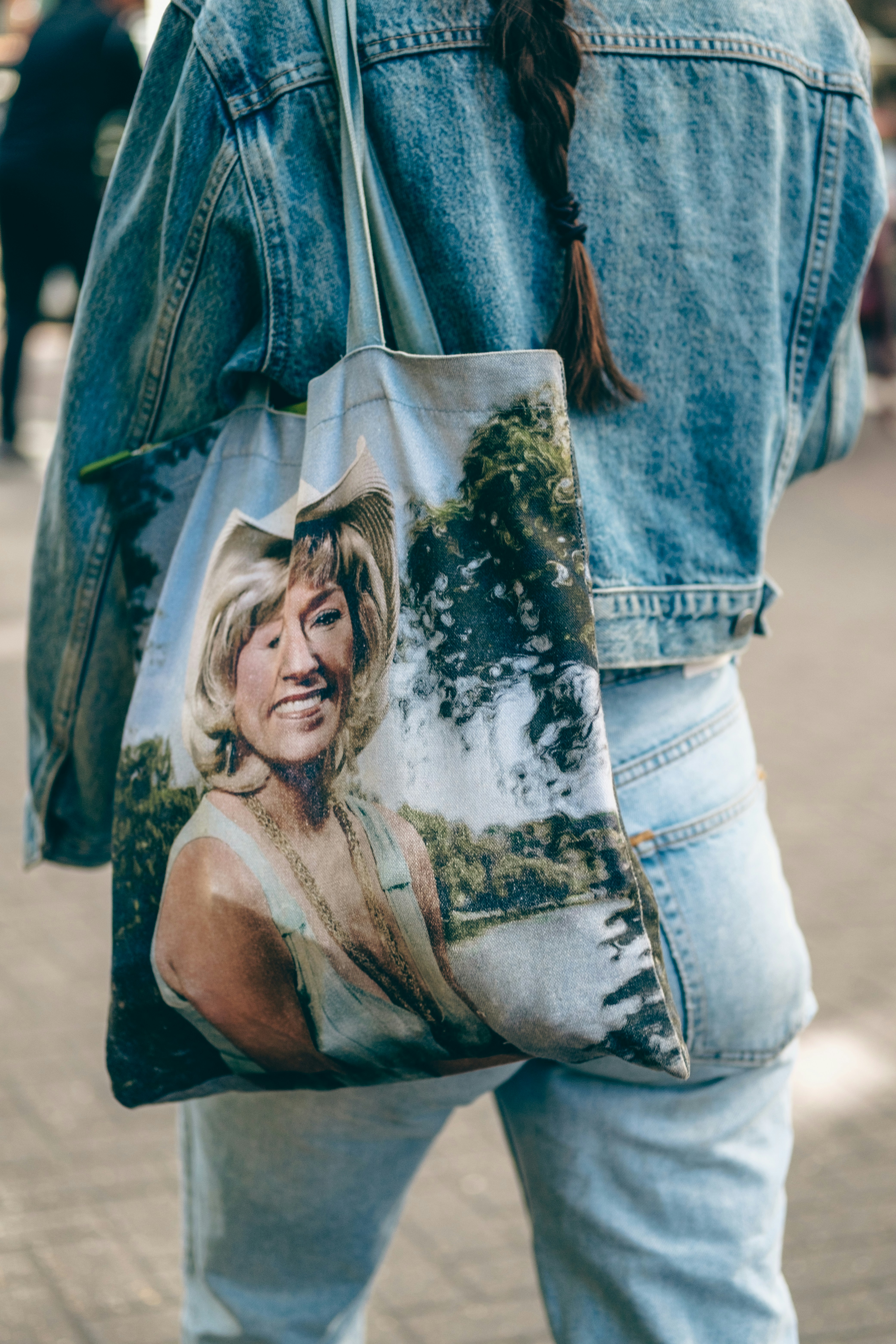 Portrait of a Denim-Clad Wanderer with a Photo Tote