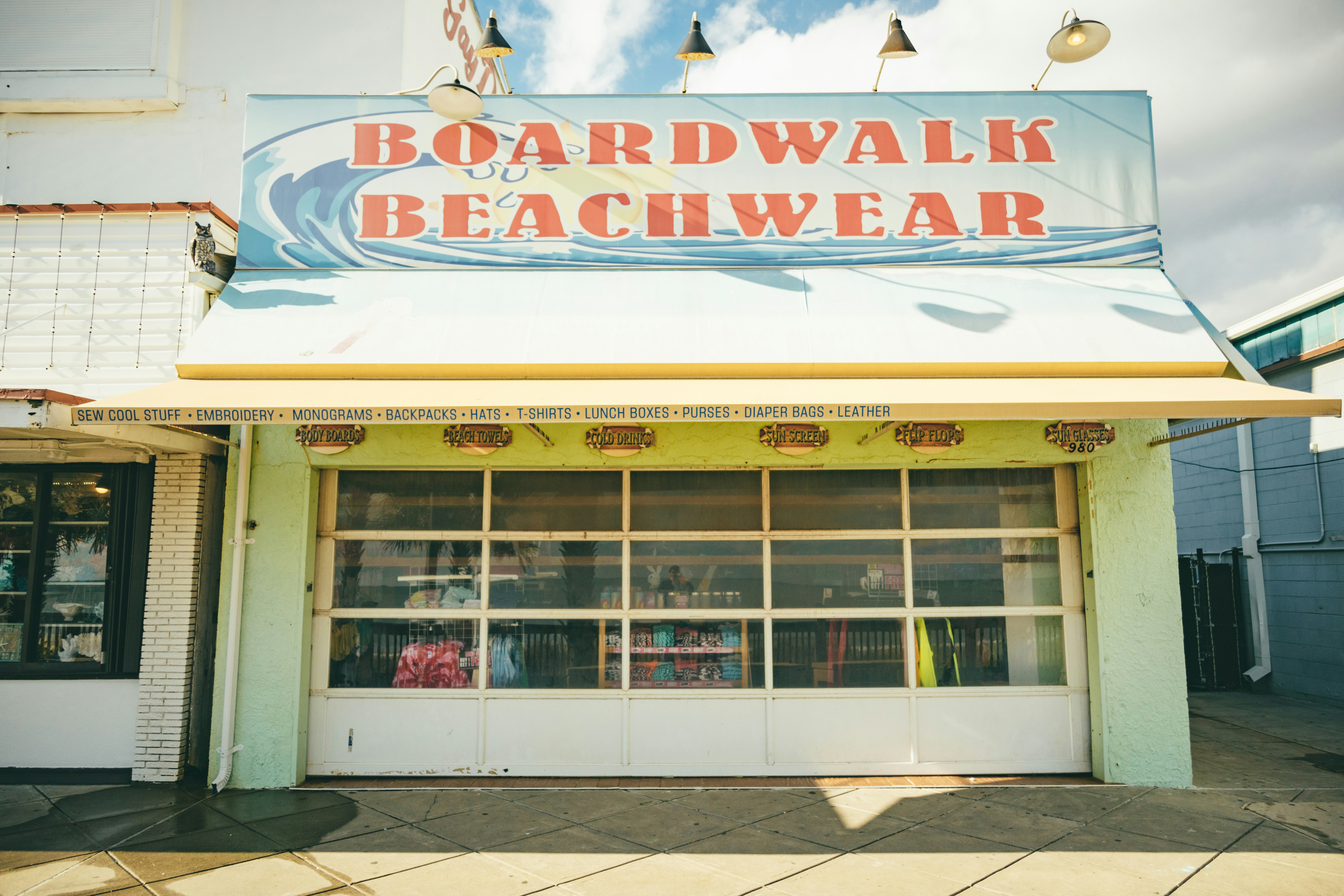 A store front with a sign above it photo – Free Myrtle beach Image on ...