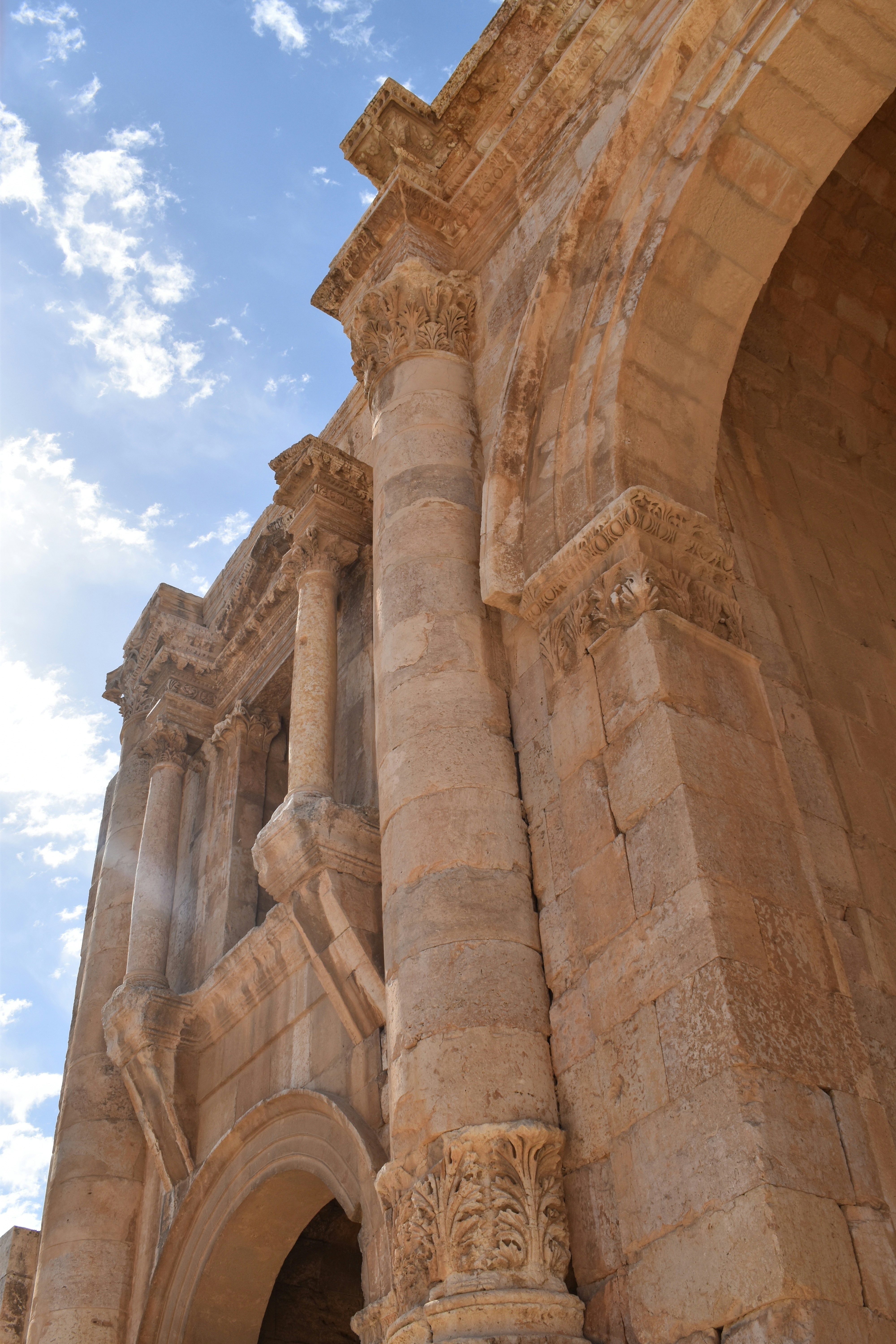 A tall stone building photo – Free Jerash Image on Unsplash