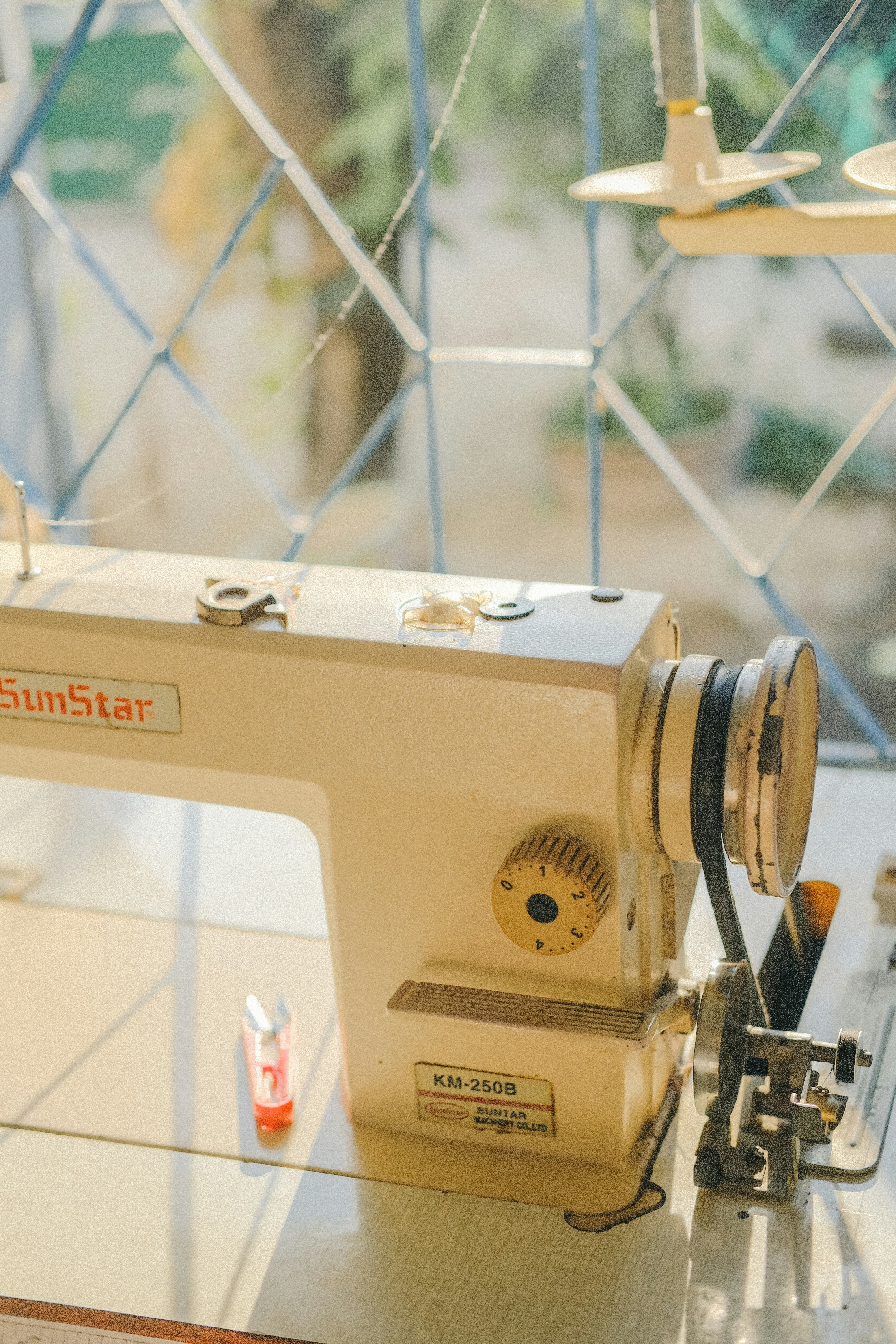Sewn Engine, Quiet Morning: A Vintage Sunstar KM-250B in Soft Focus