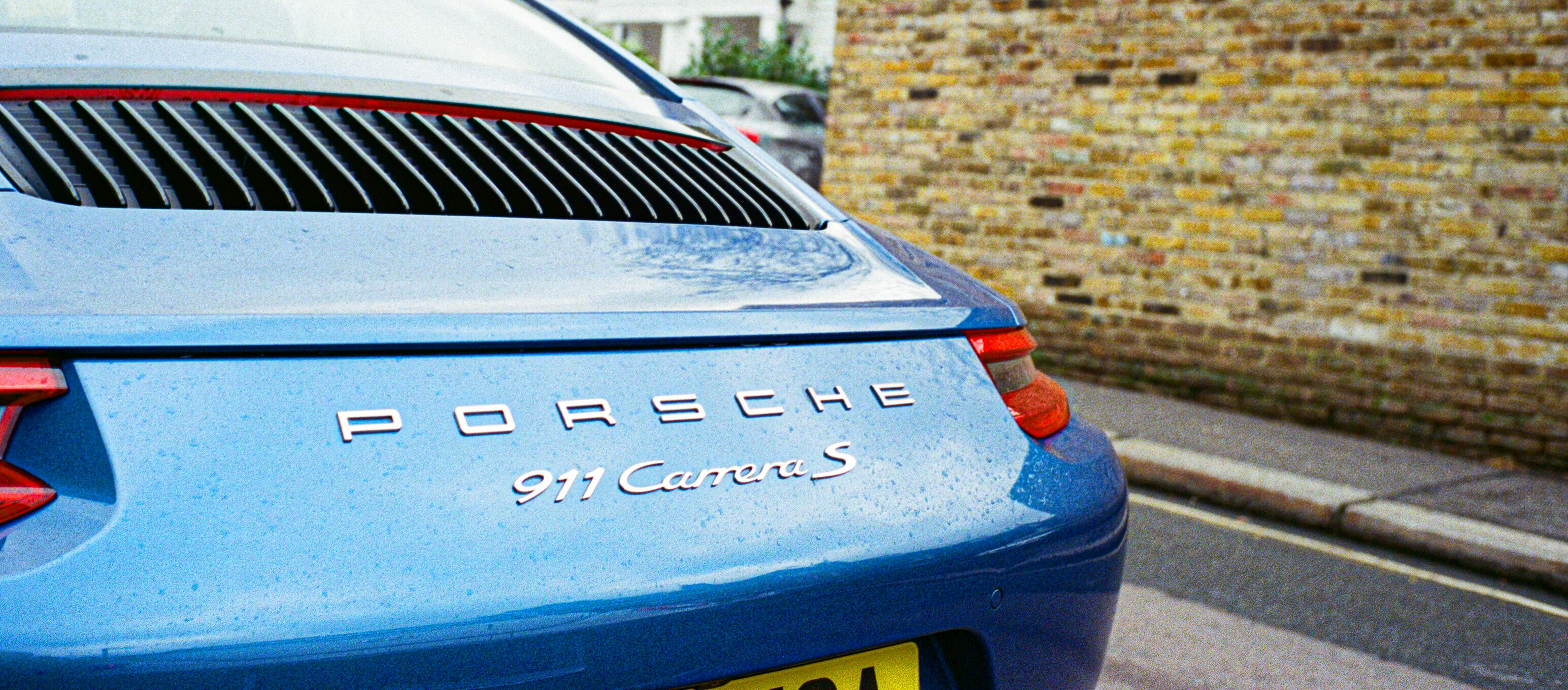 A blue car with writing on it photo – Free Car Image on Unsplash