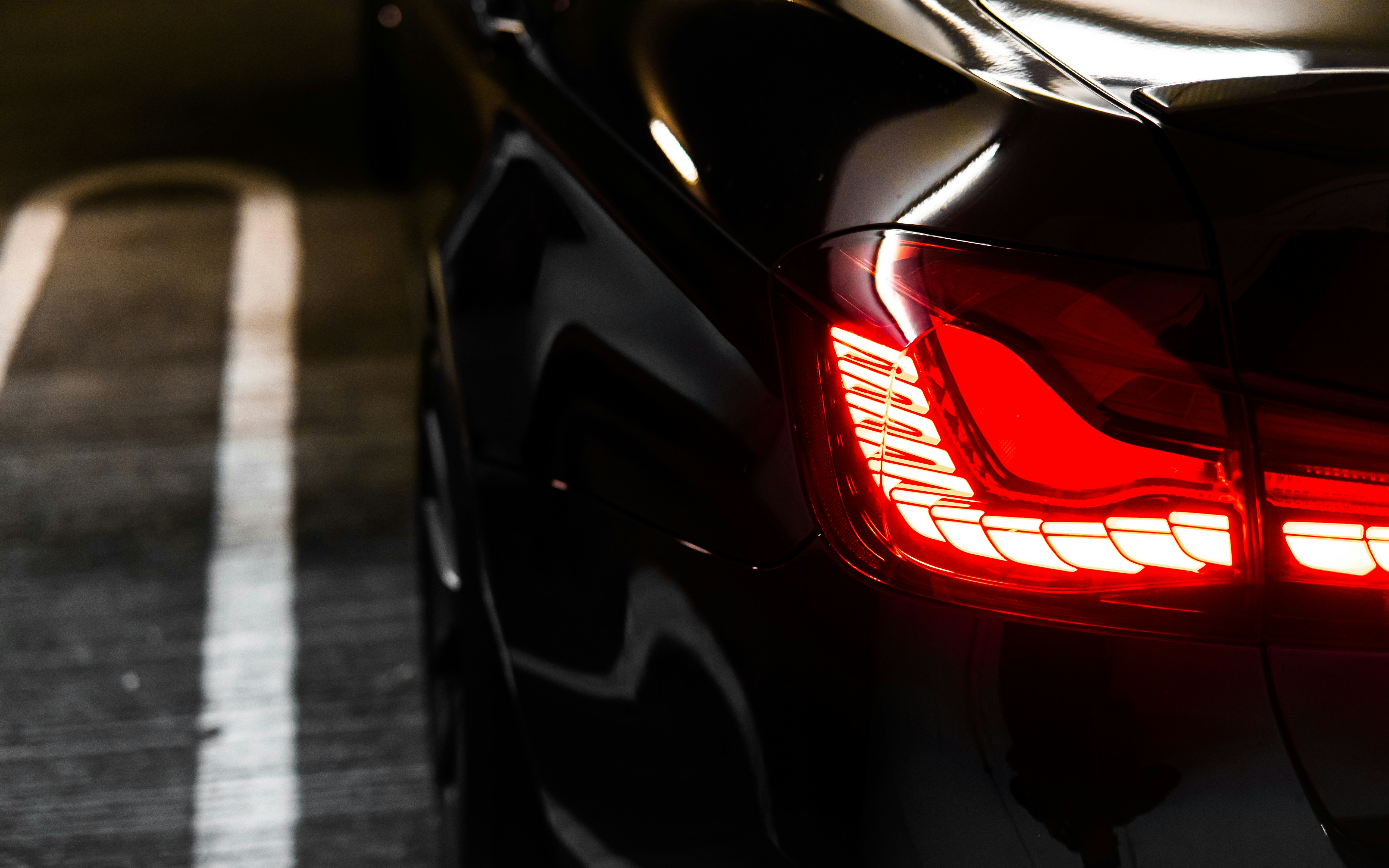A car with its rear lights on photo – Free Bellevue Image on Unsplash