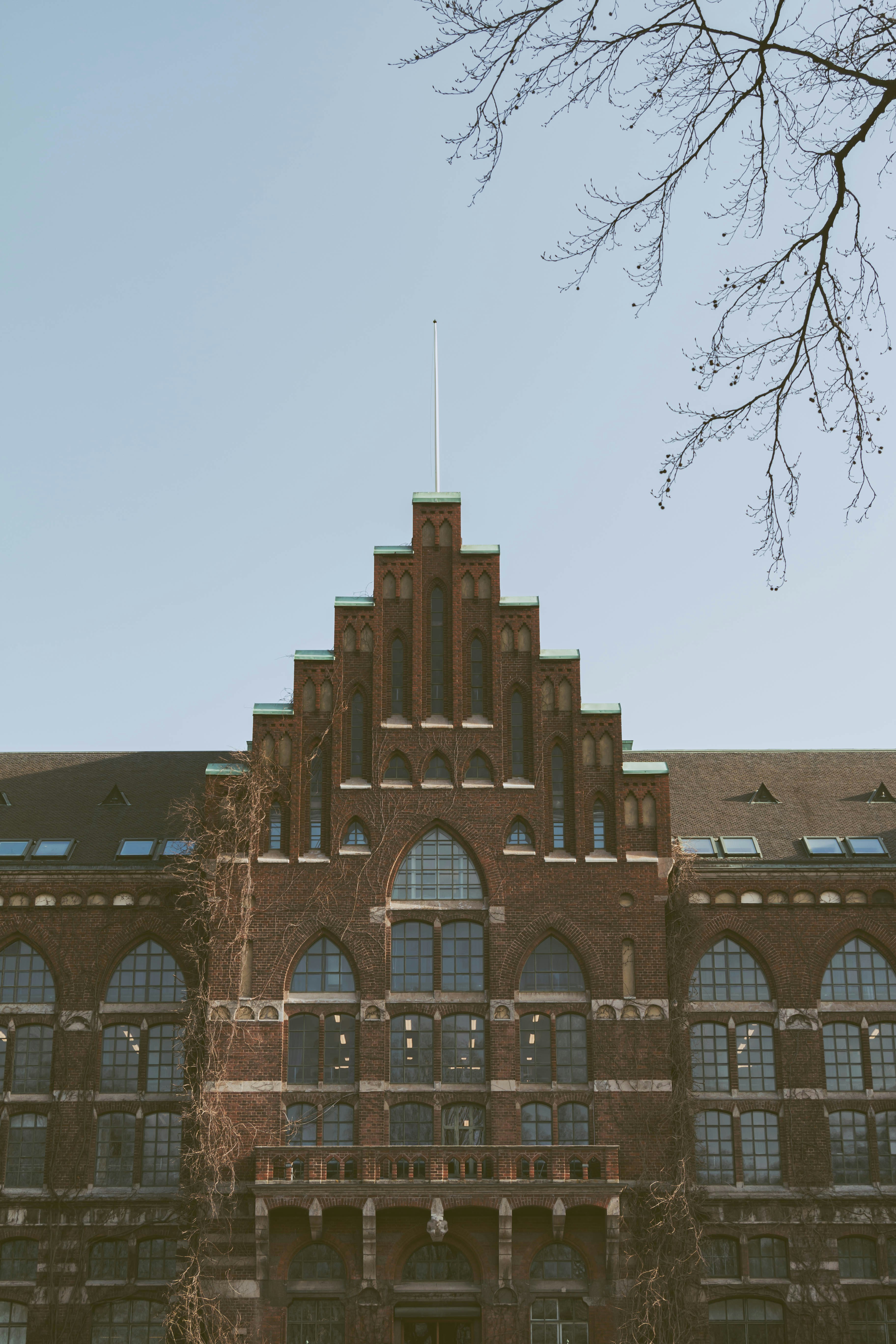 a tall building with a tall antenna