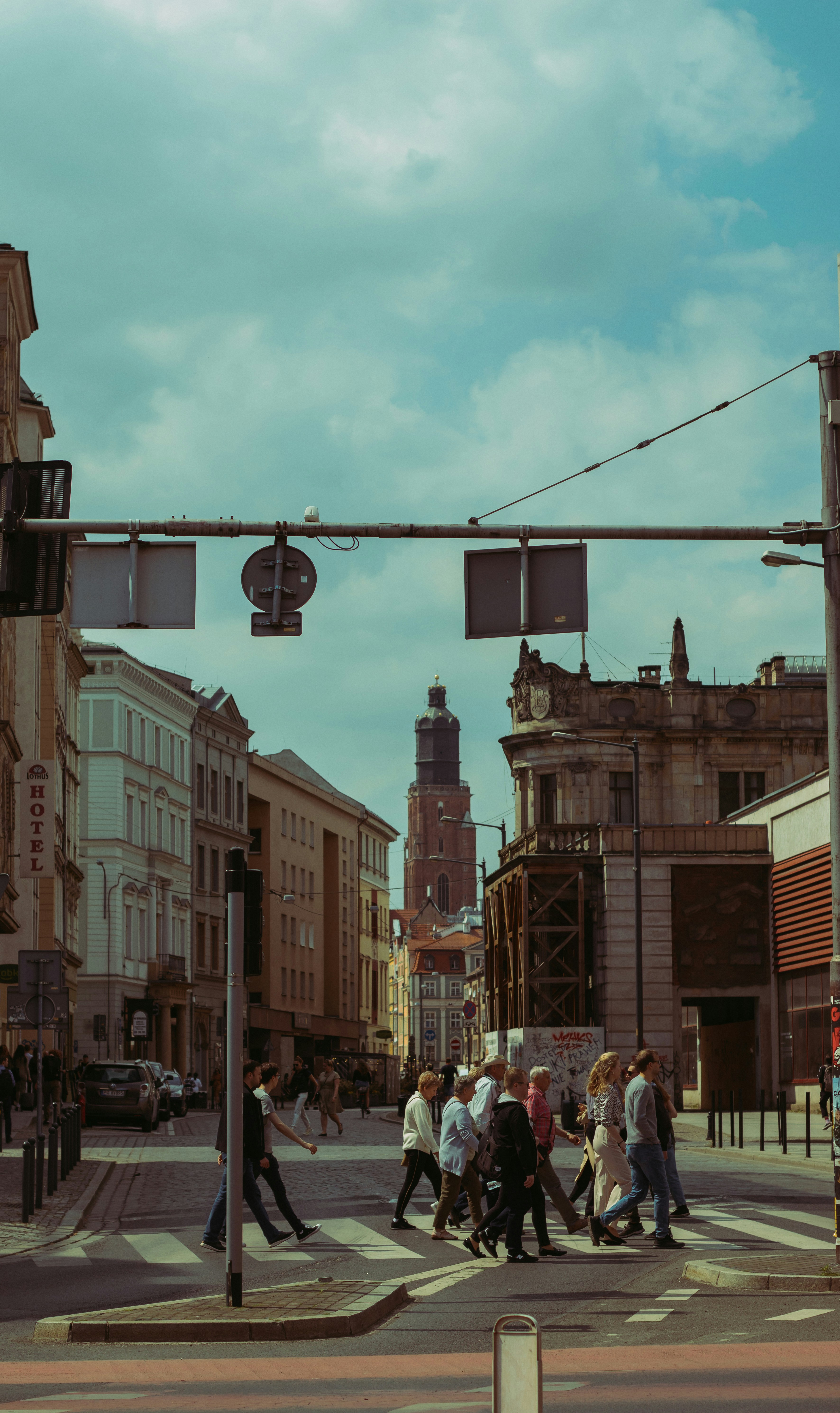 people crossing a street