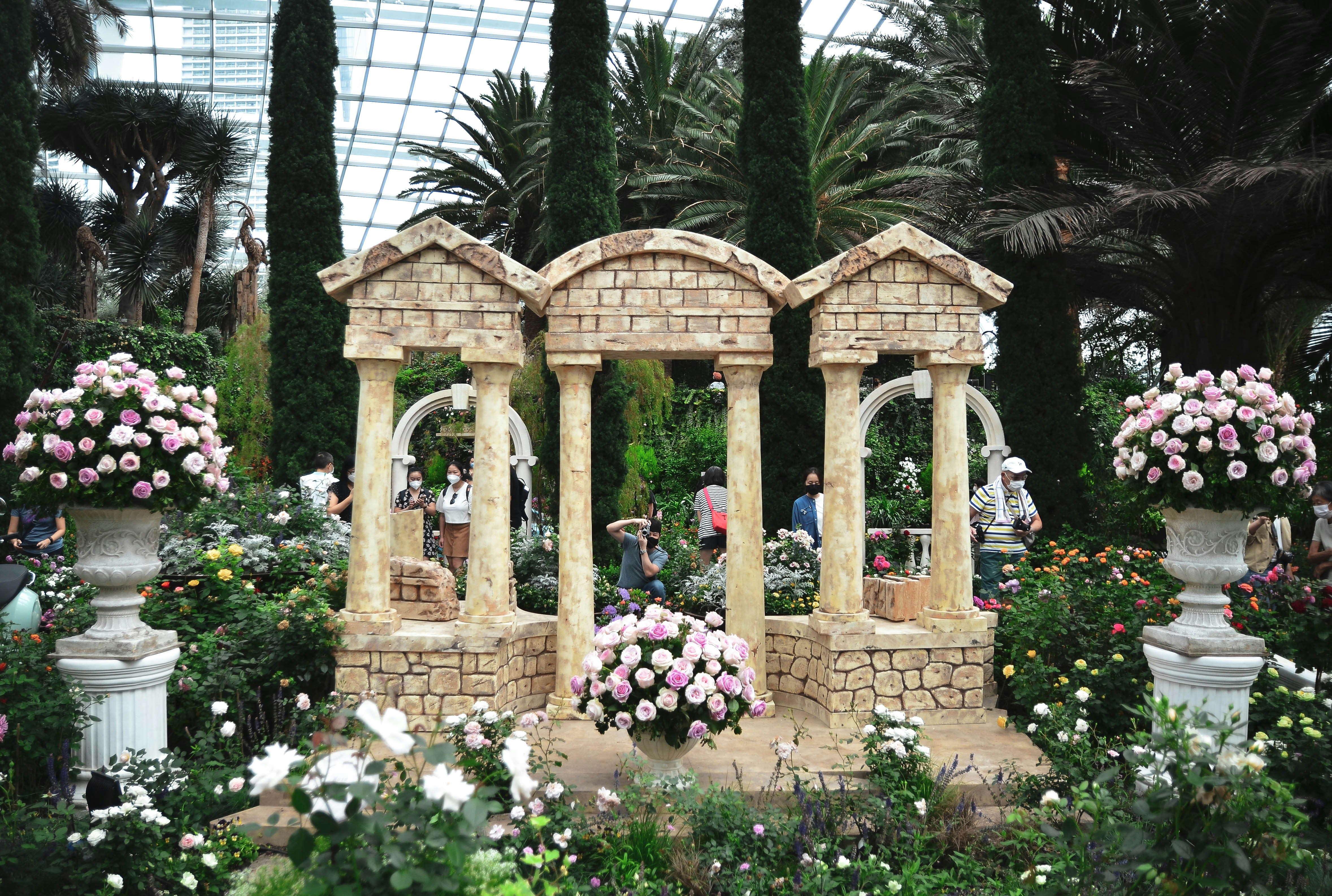 Stone Arc Trio in a Blooming Garden Conservatory