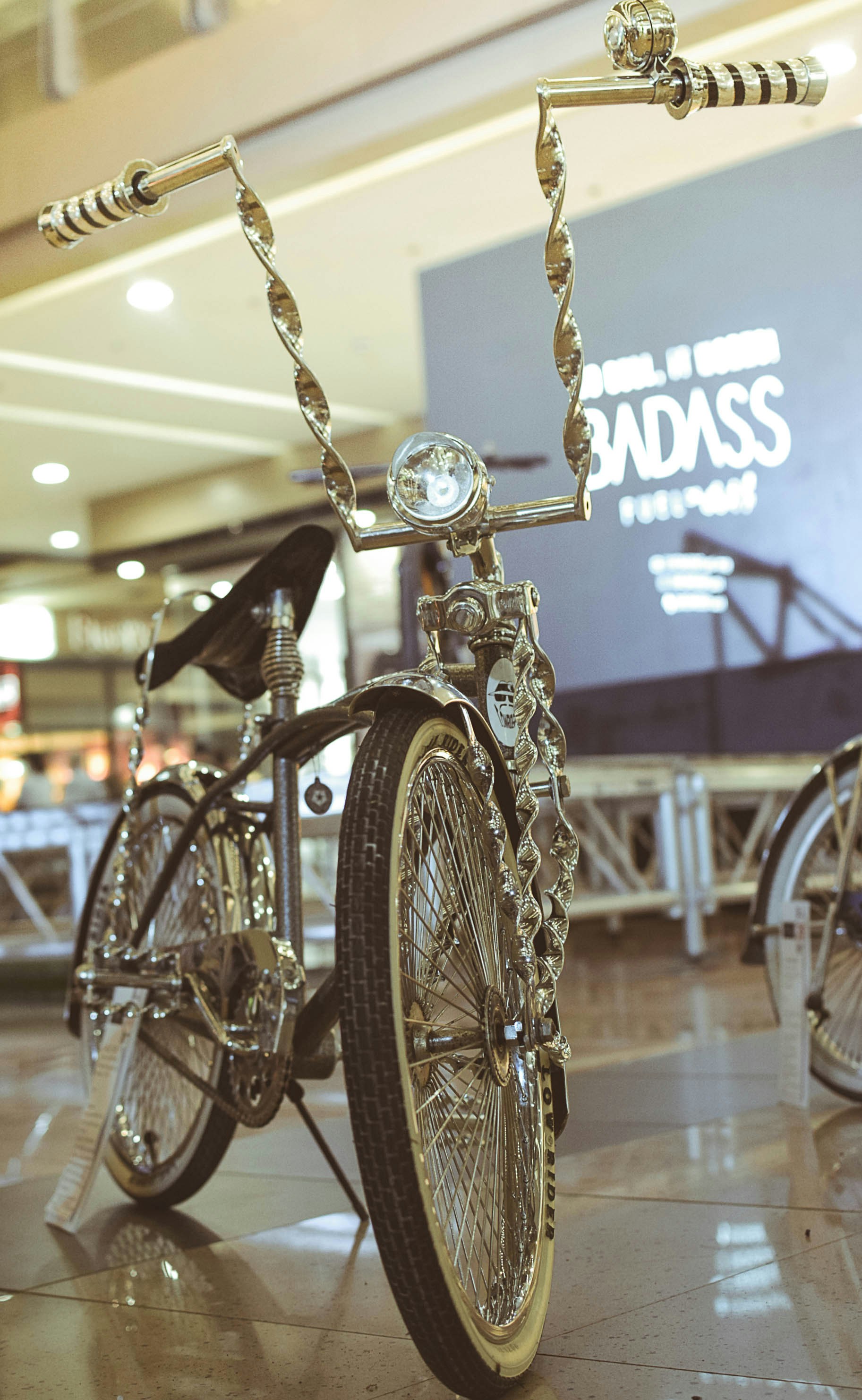 Chrome Bicycle Sculpture at a Mall Exhibition