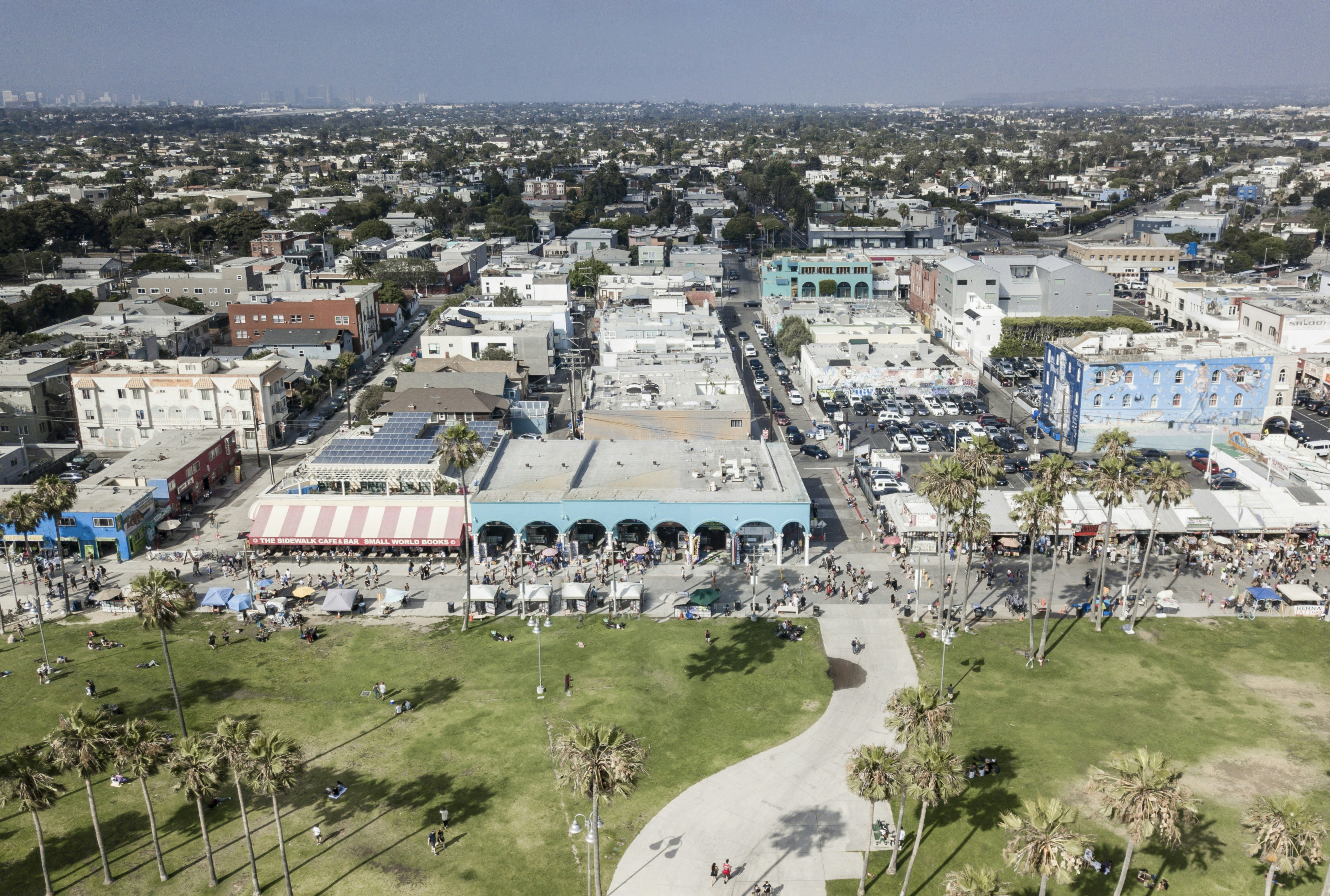 Coastal Boardwalk Arcades Bordered by Colorful Buildings