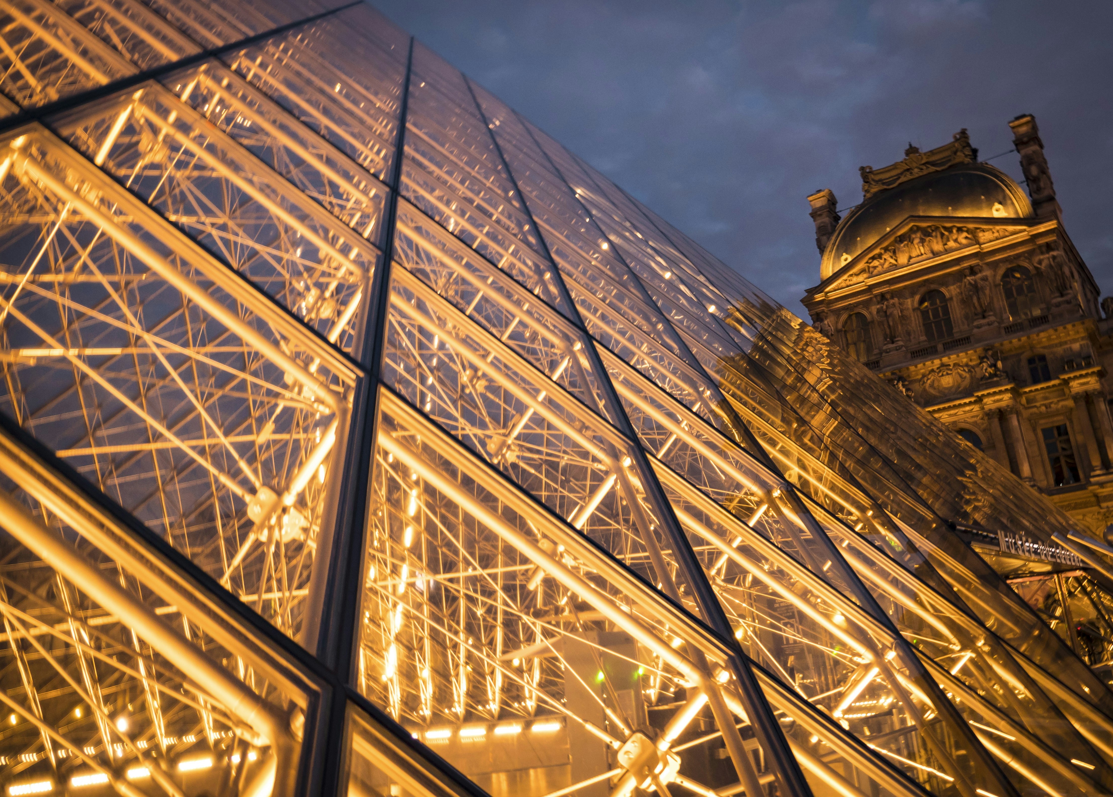 A large glass building with a tower photo – Free Brown Image on Unsplash