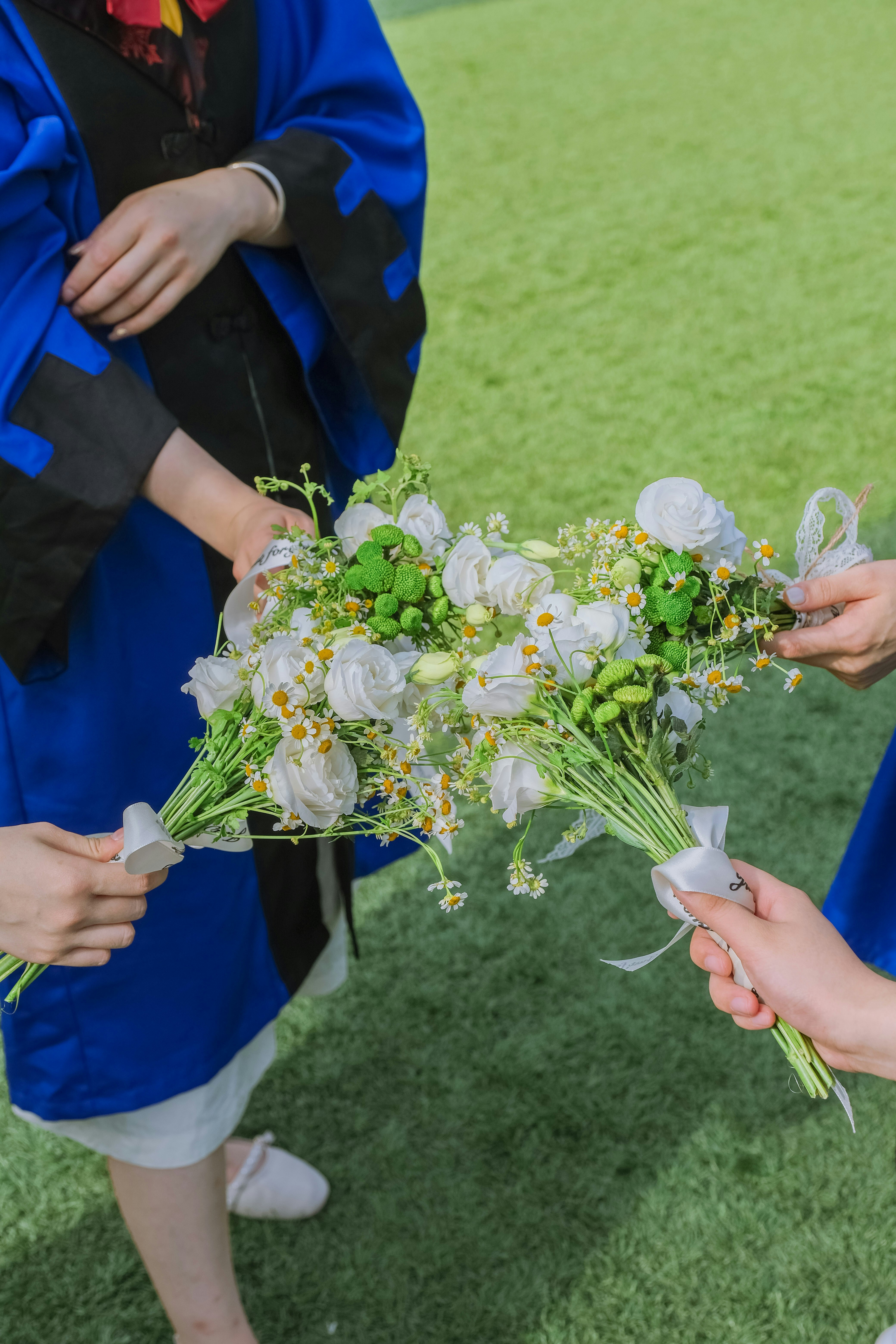 Whispered Bouquet Hand-Off on Sunlit Grass