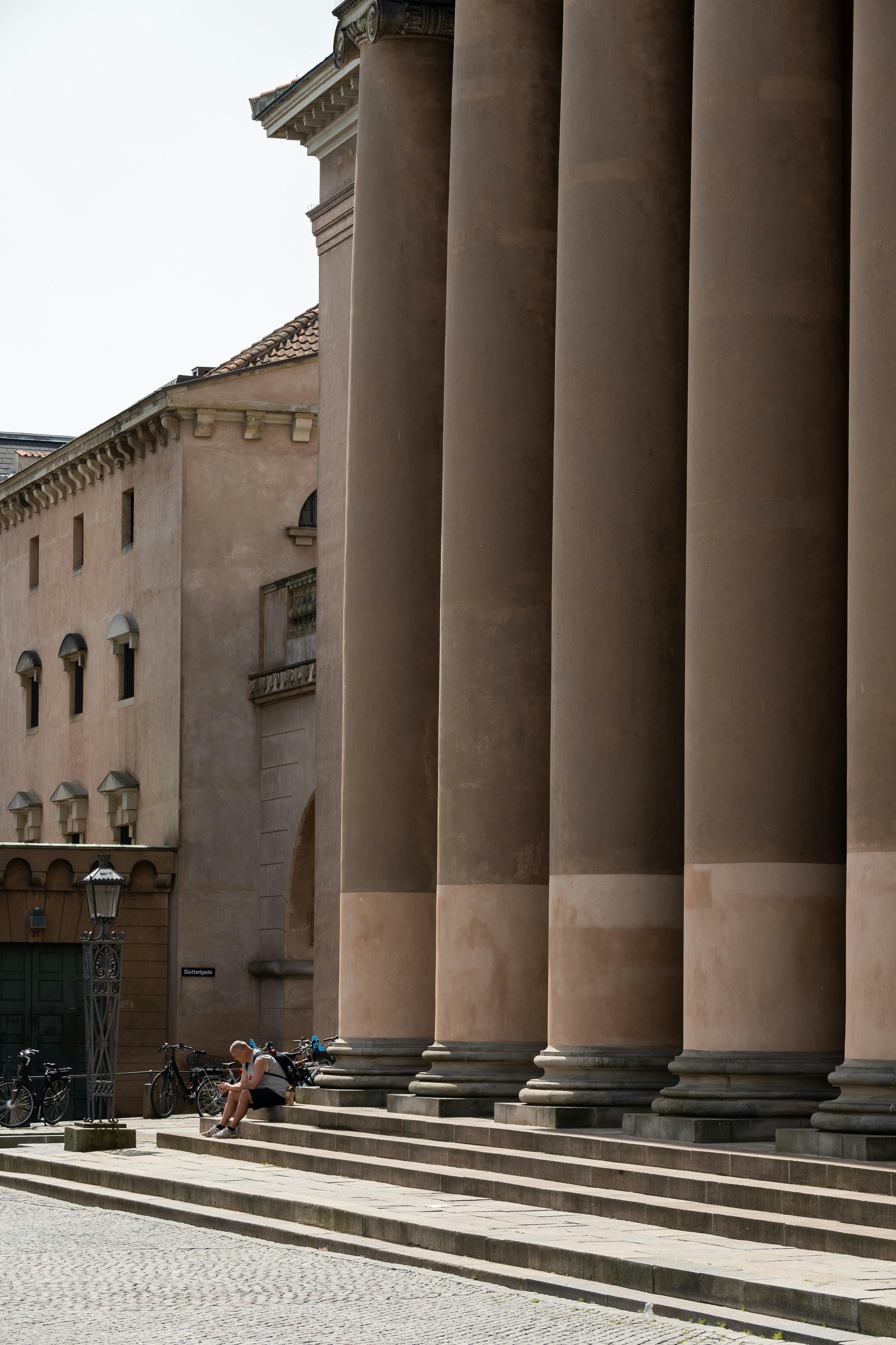 Shadows and Stone: Quiet Moment on Grand Steps