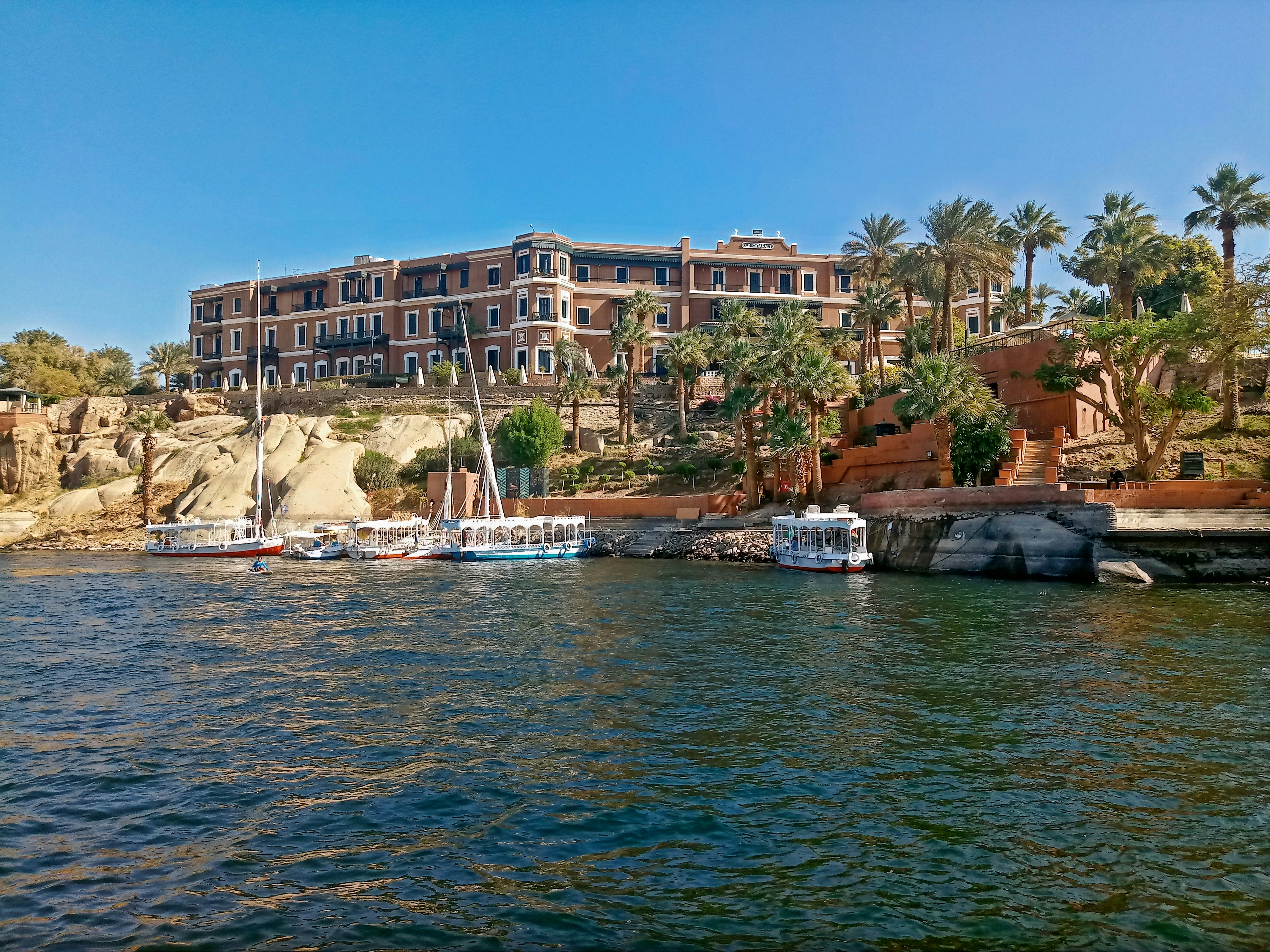 Nile River, Aswan, Egypt | a building on a hill