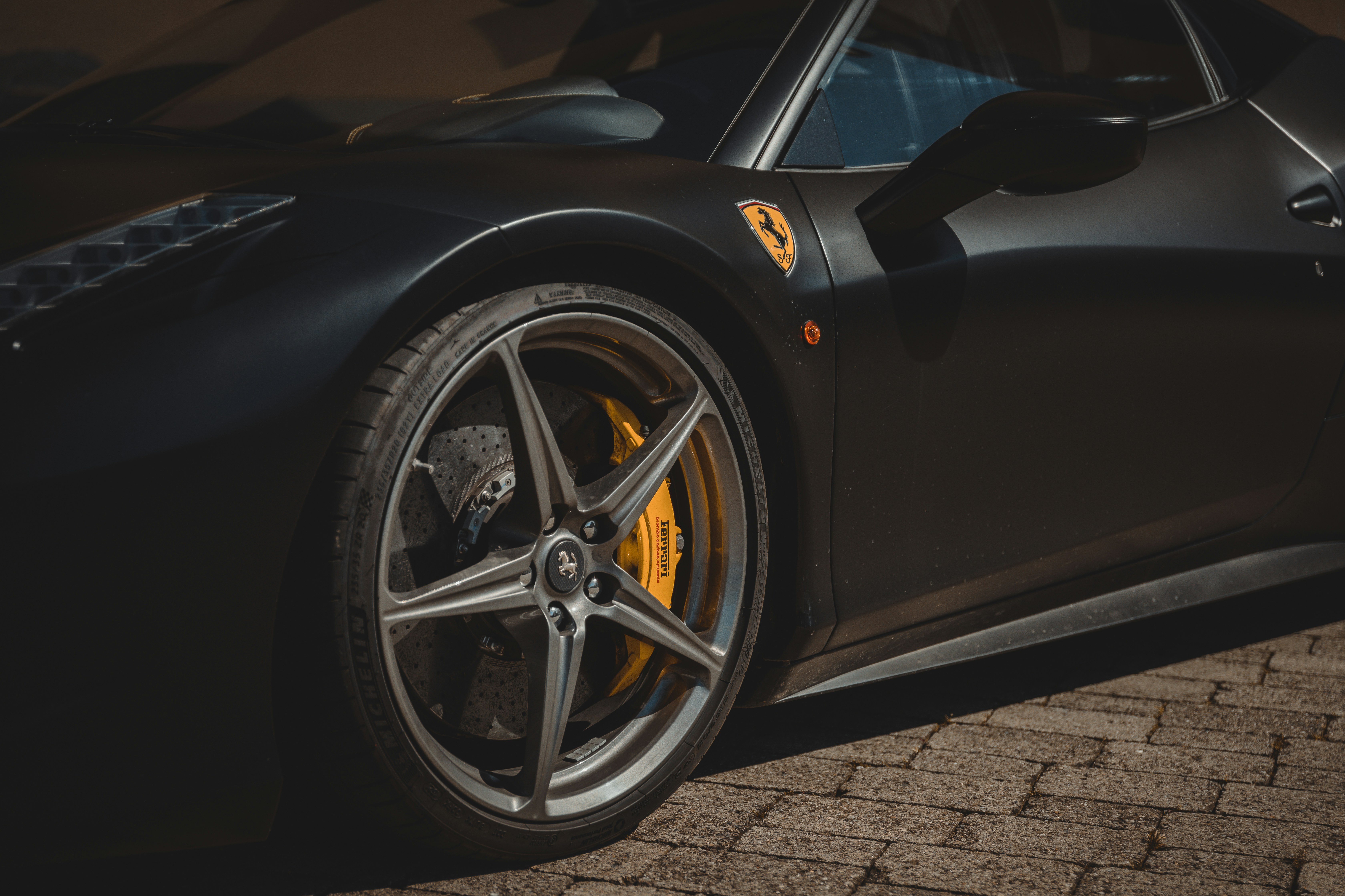 a black car with a black rim