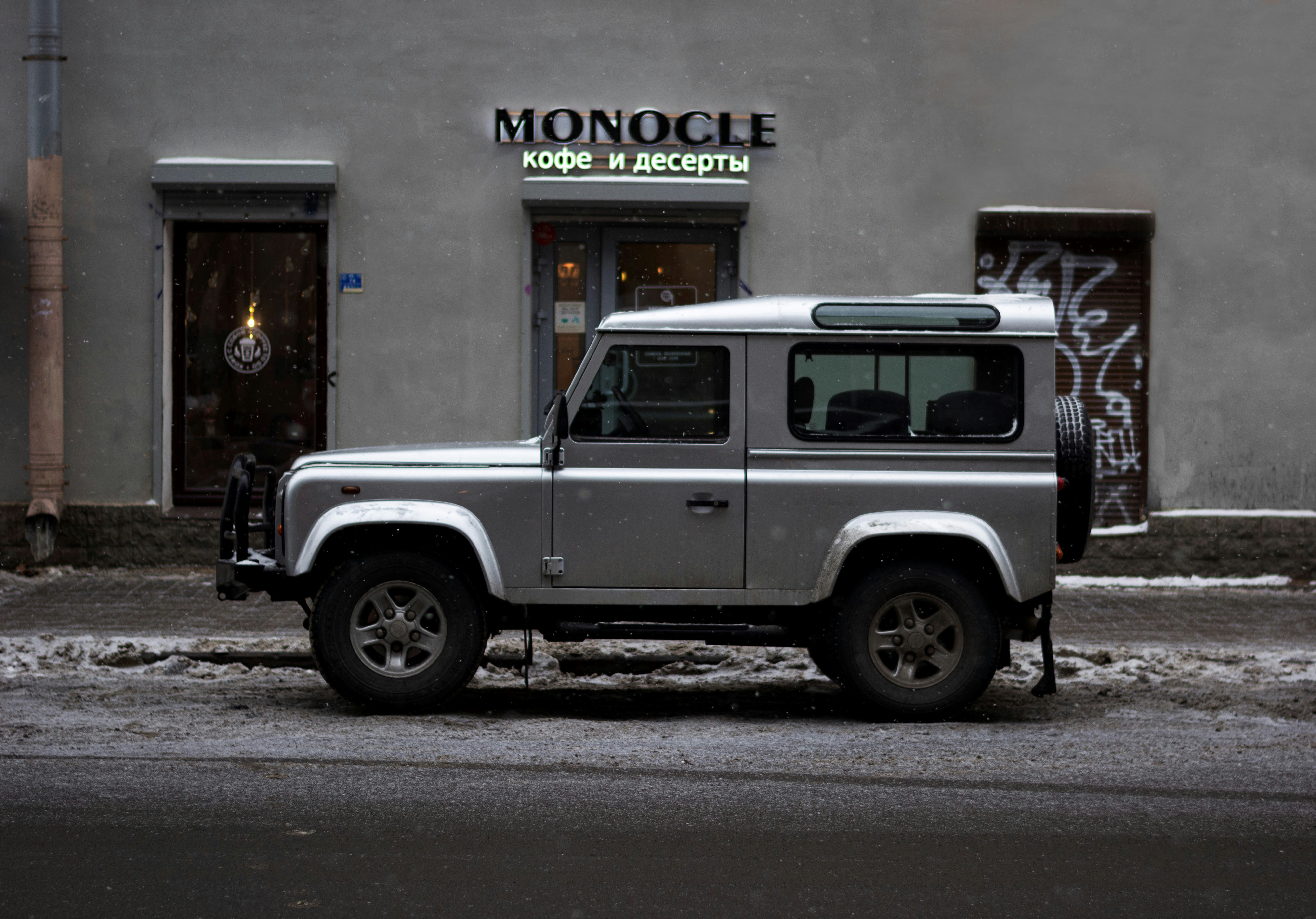 a car parked in front of a building