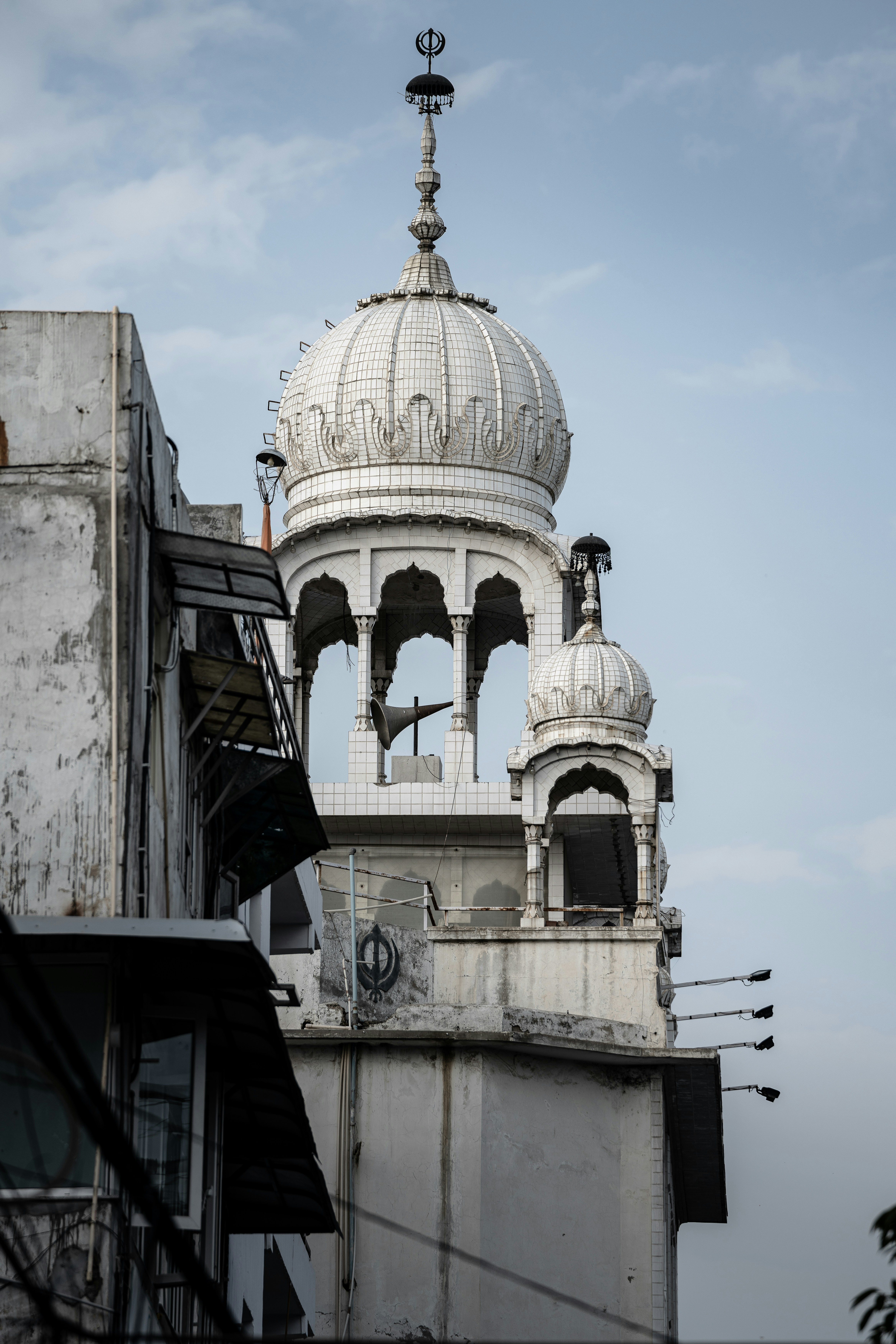 Silvery Rooftop Domes: Urban Architecture in a Pale Sky