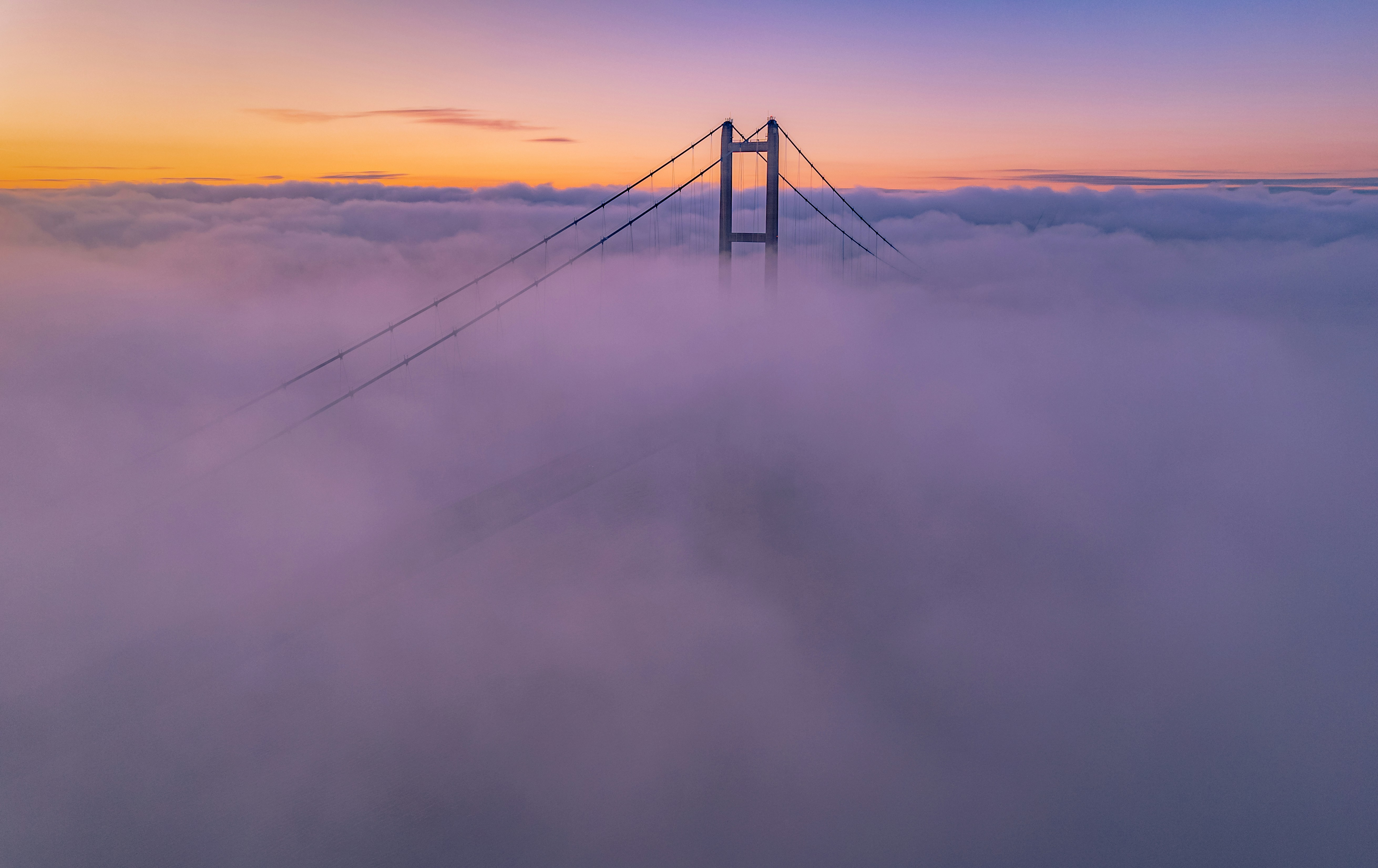 A bridge over the clouds photo – Free Humber bridge Image on Unsplash