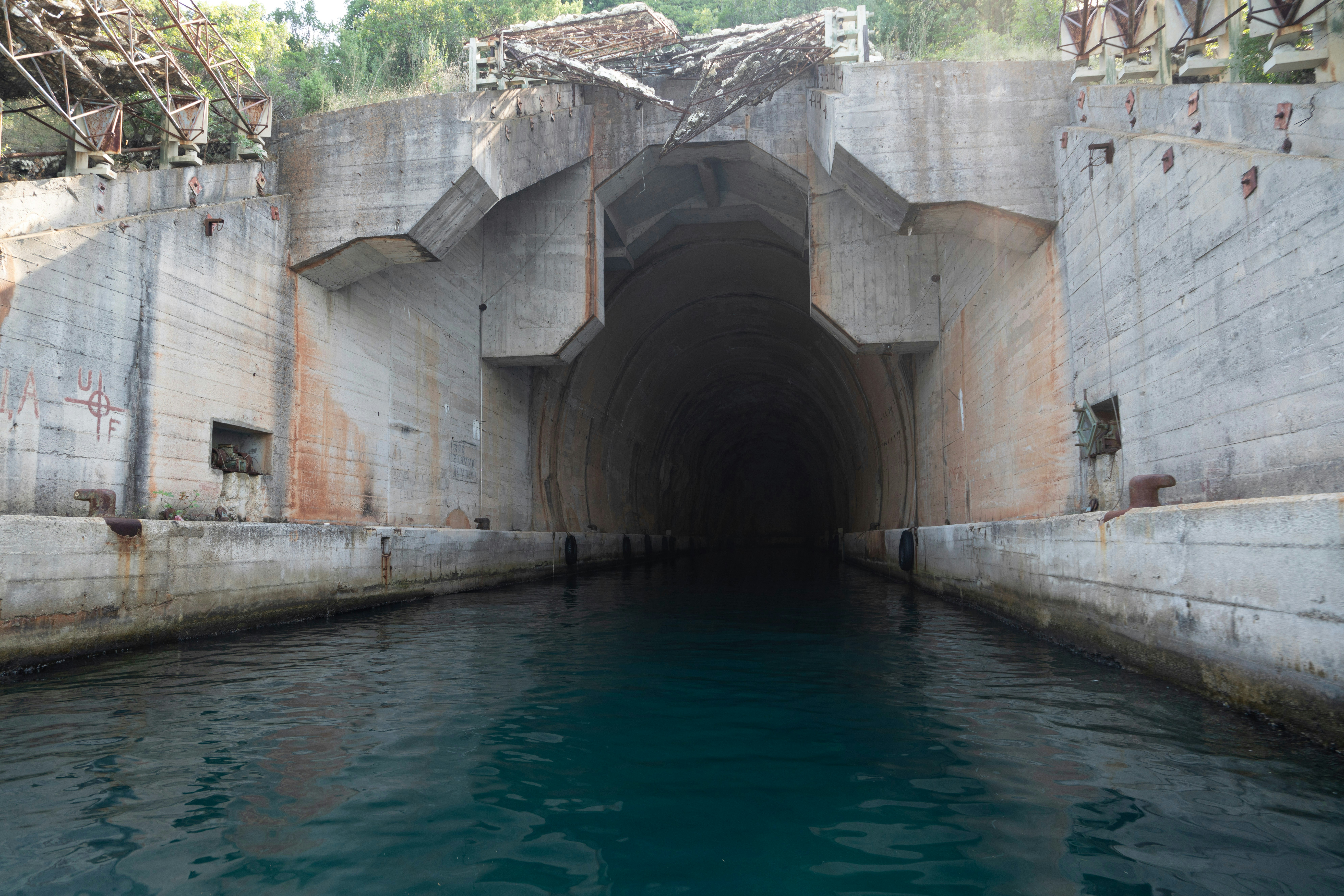 The Quiet Gateway: Concrete Canal into Darkness