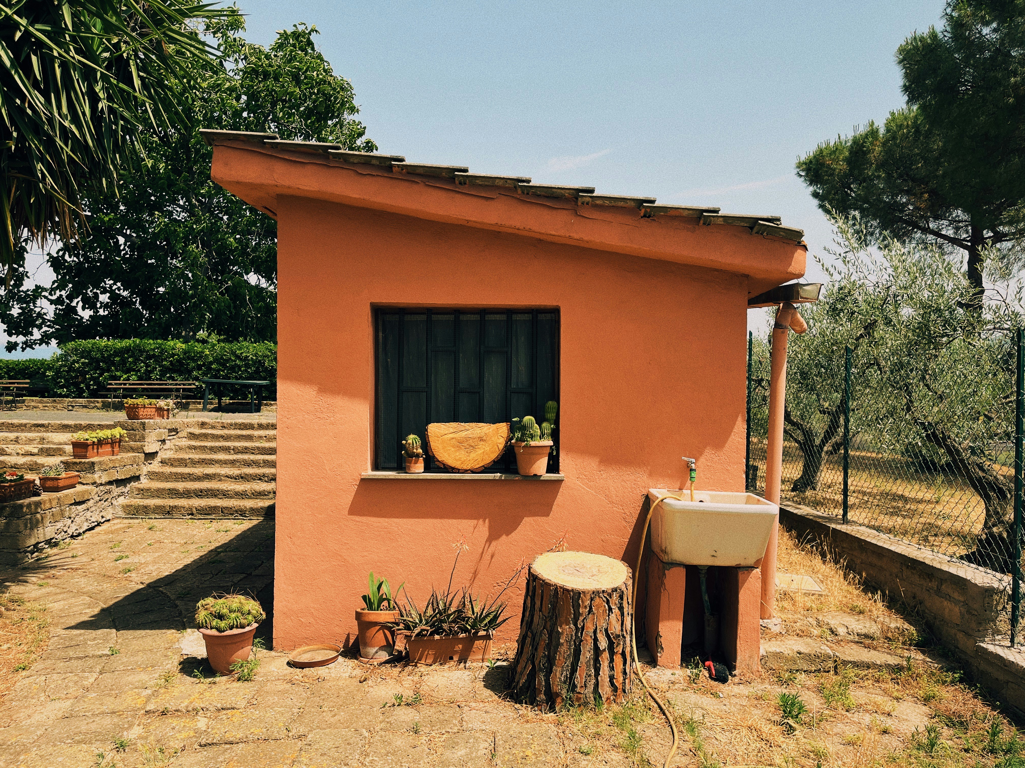 A small orange house photo – Free Stucco Image on Unsplash