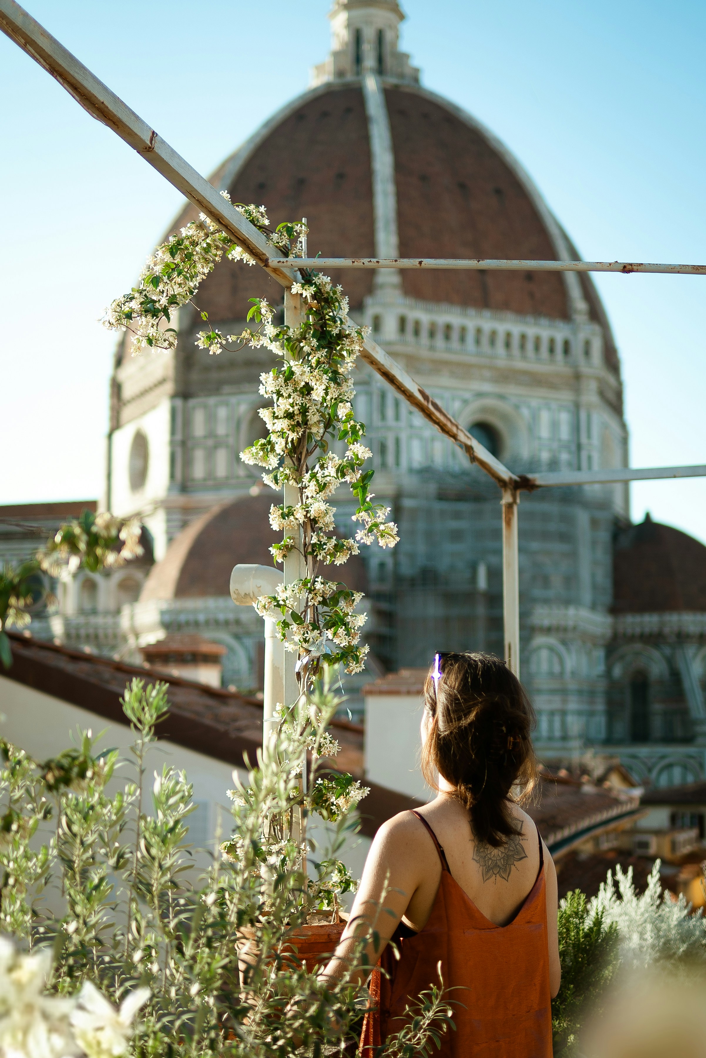 Rooftop Serenade: An Orange Dress with Florence's Duomo in the Background