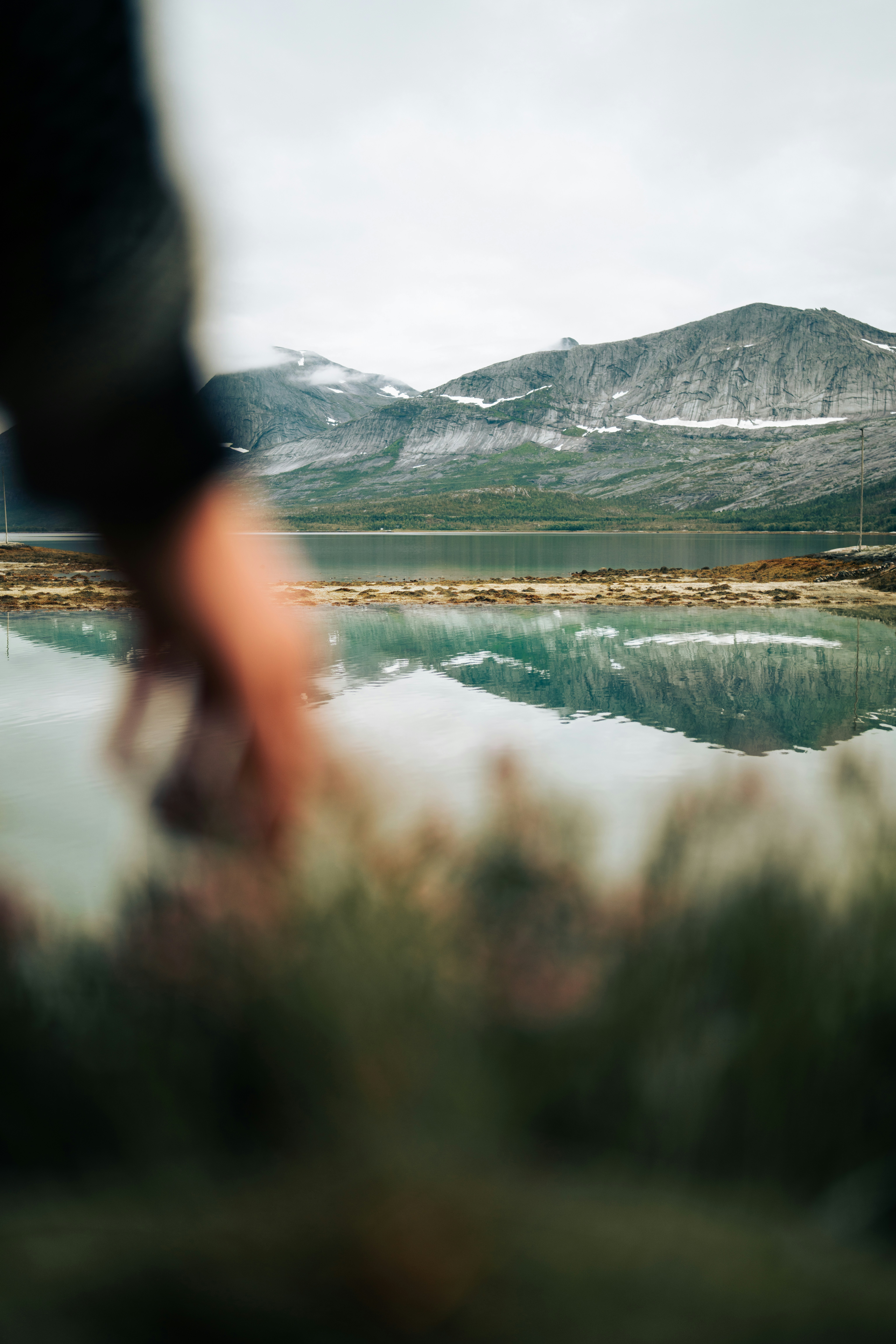Echoes of Granite: Mountain Ridge Reflected in a Quiet Lake