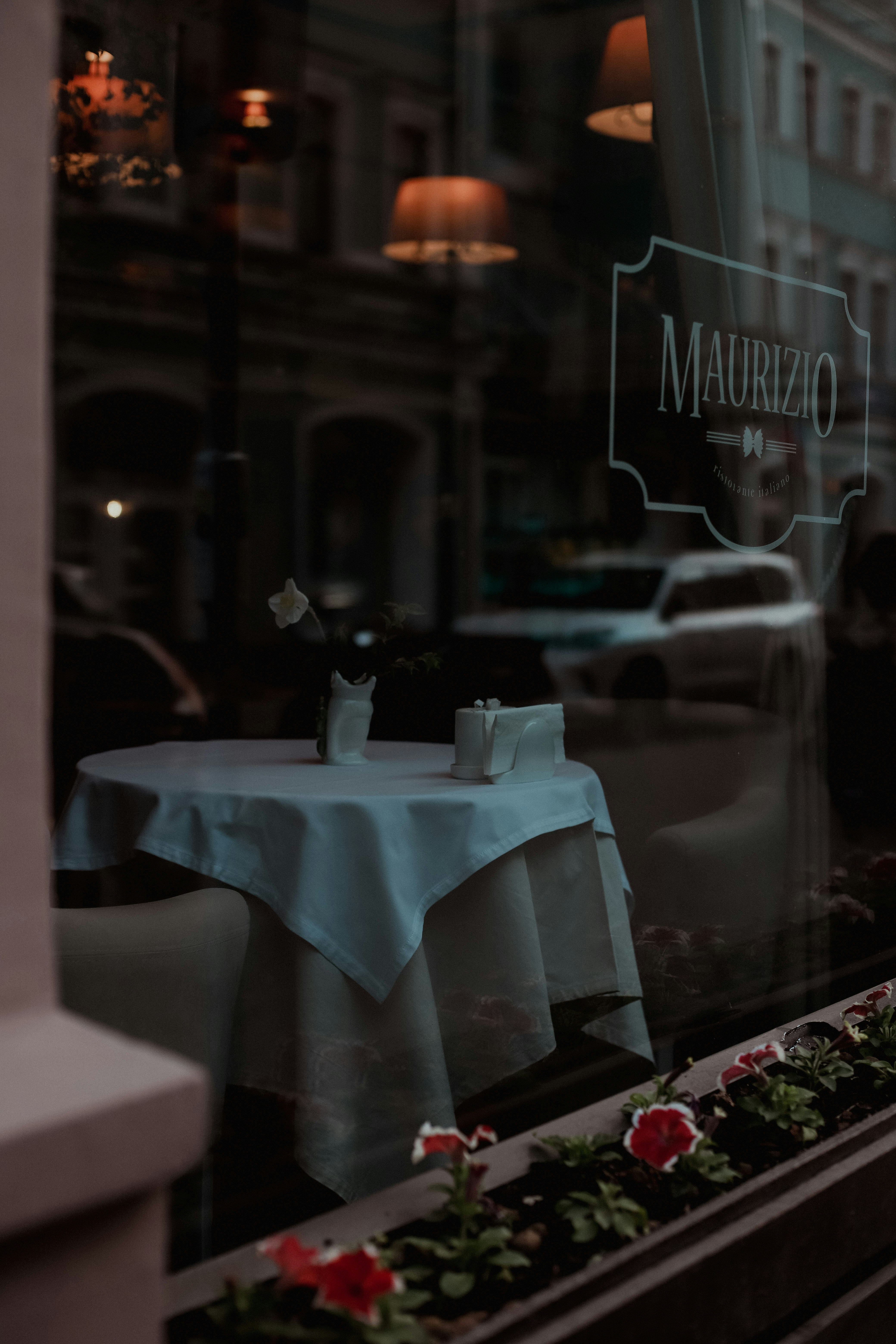 Veiled Café Window: Soft Light on a Quiet Table
