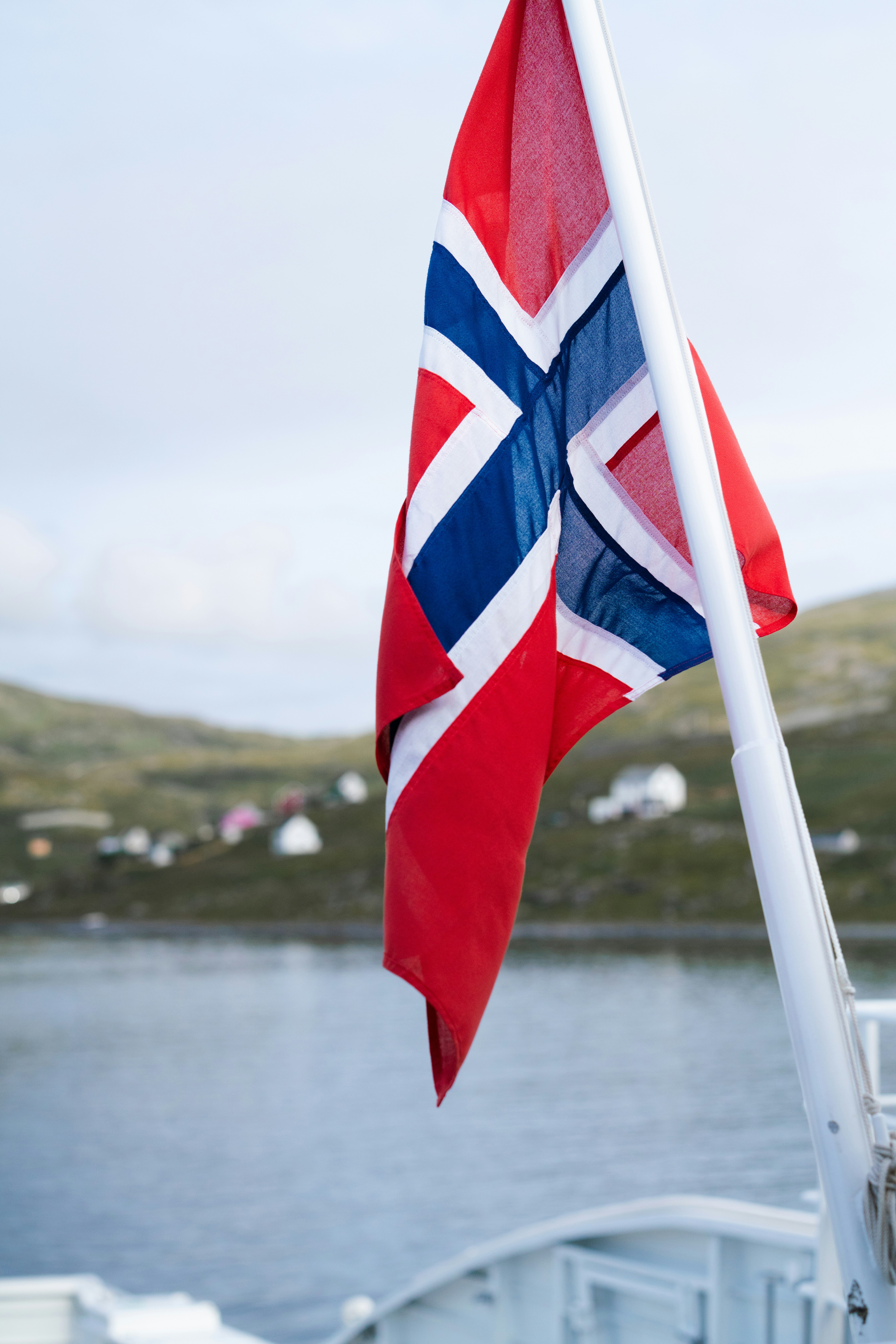 A flag on a boat photo – Free Flag Image on Unsplash