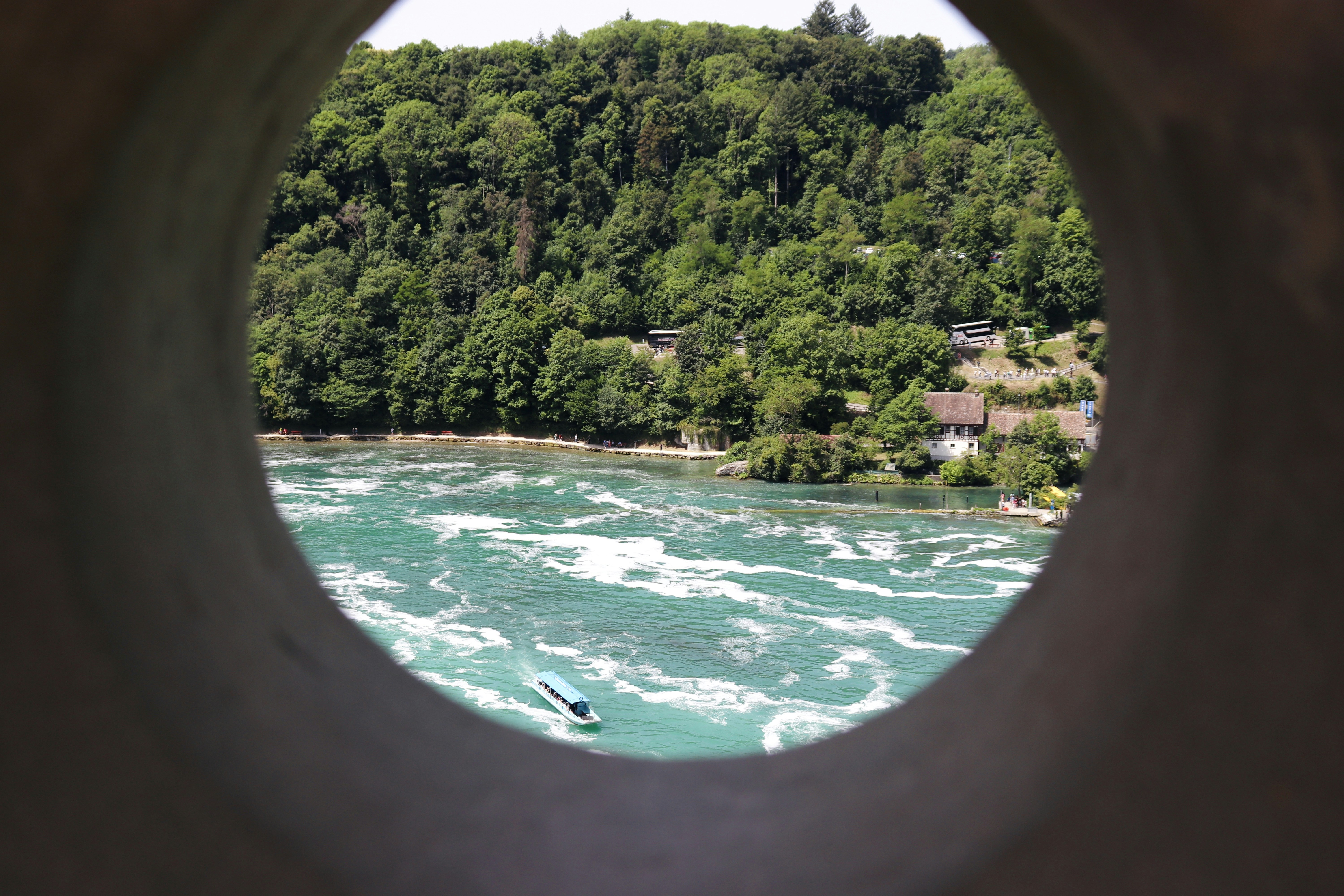 A circular window to a river-side retreat