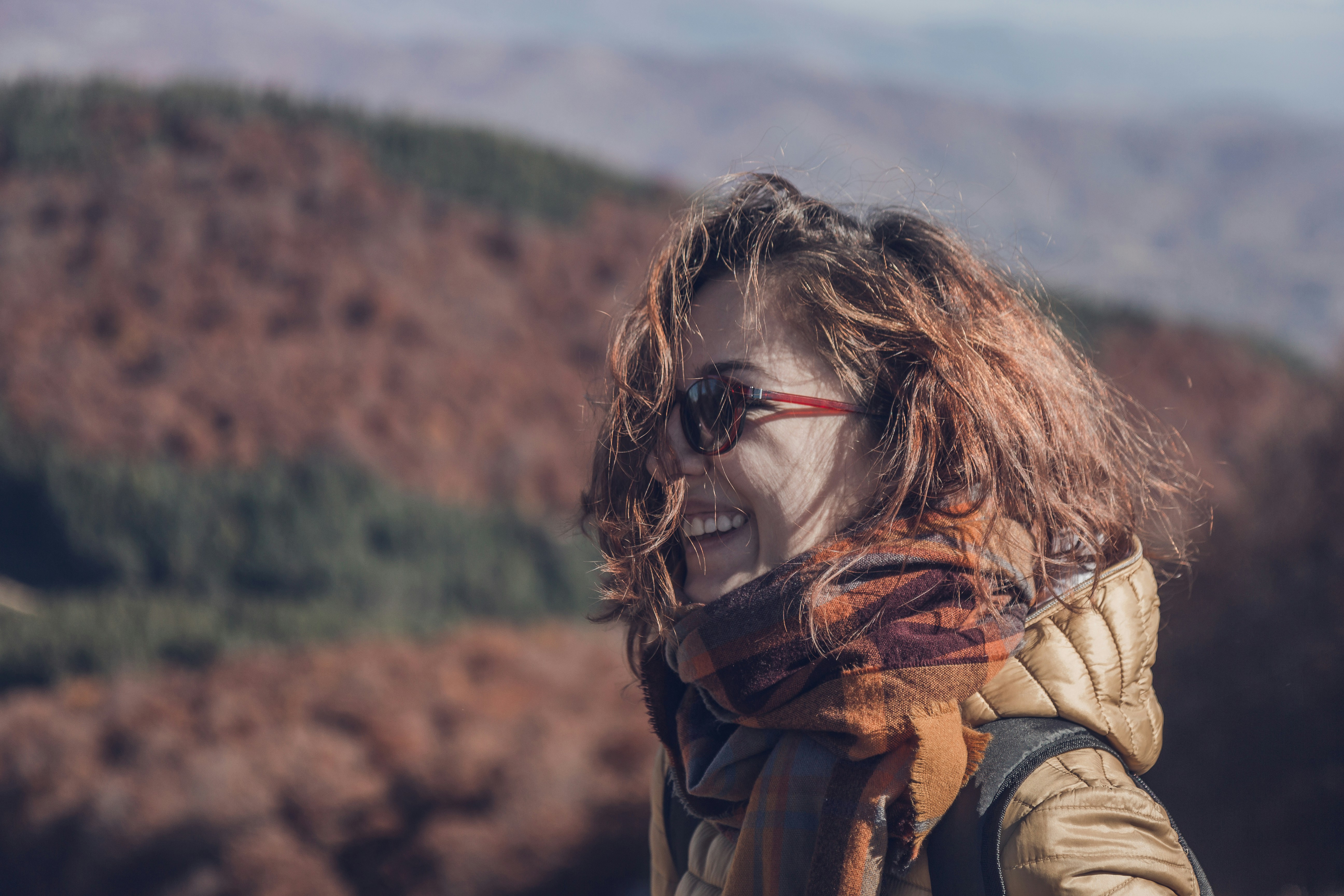 Wind-Swept Portrait Above a Red Canyon Overlook