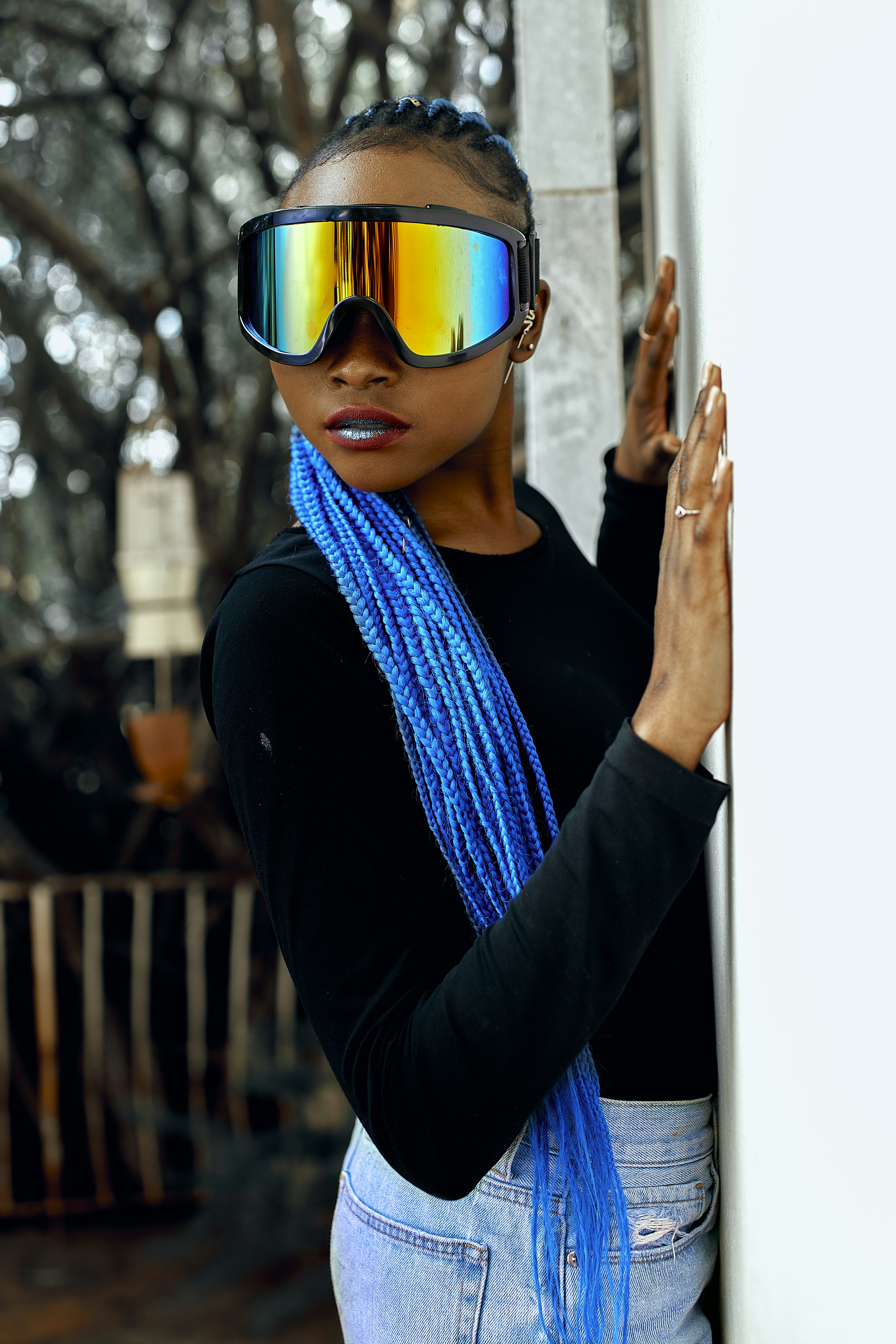 Foto Una mujer con gafas de sol – Imagen Zimbabue gratis en Unsplash