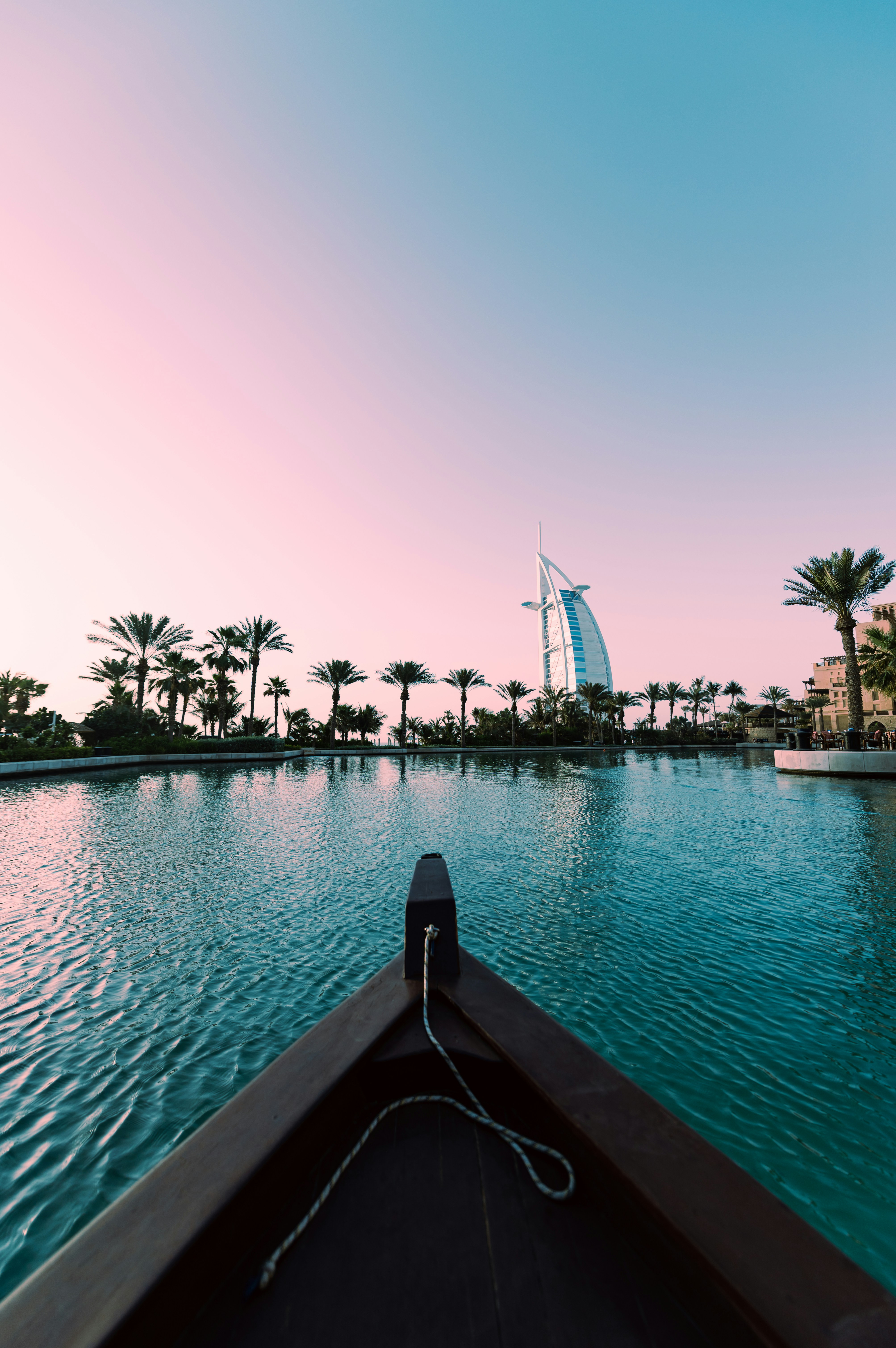Prow to the Horizon: Dubai Palm Waterway and the Burj Al Arab at Sunset