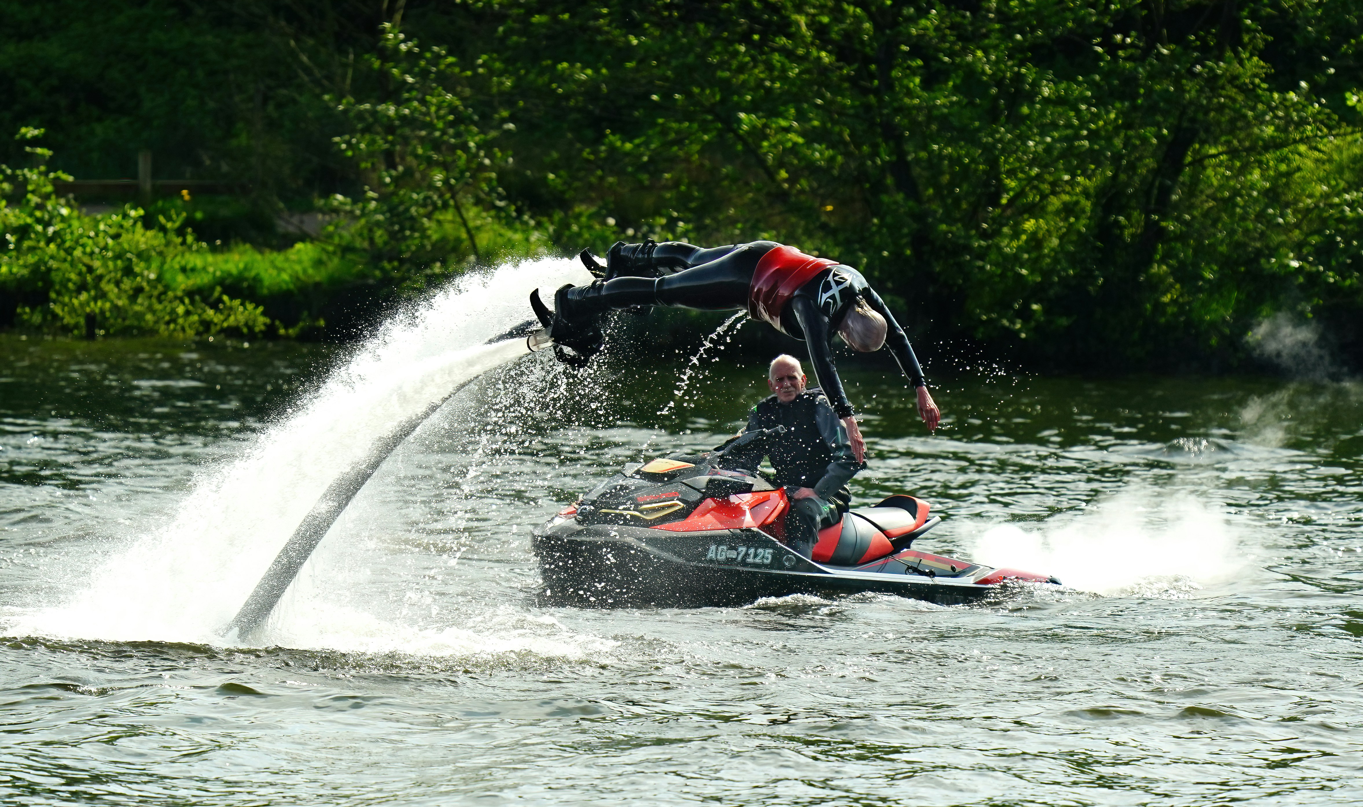 A man riding a jet ski photo – Free Human Image on Unsplash