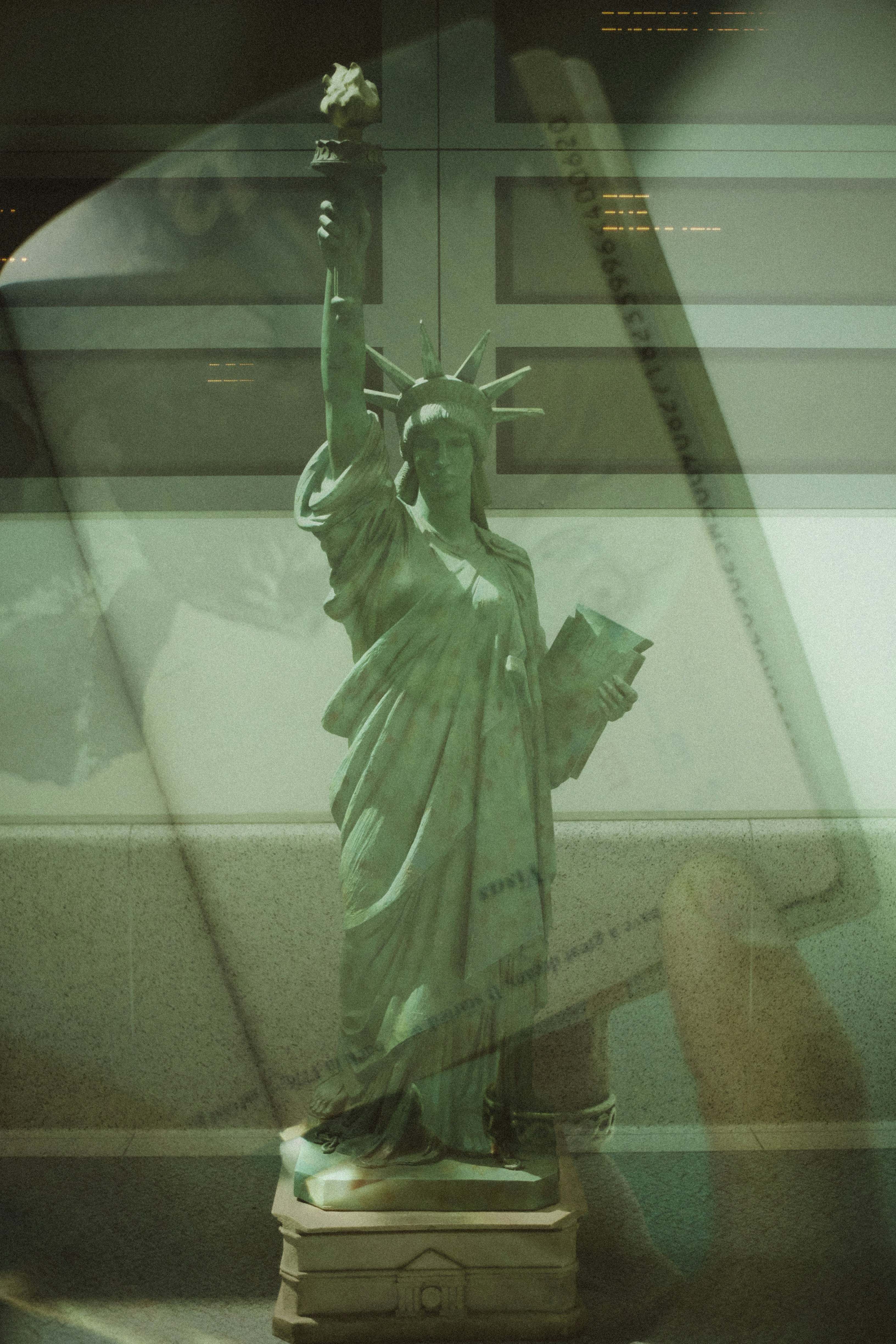 a statue of a person holding a sword