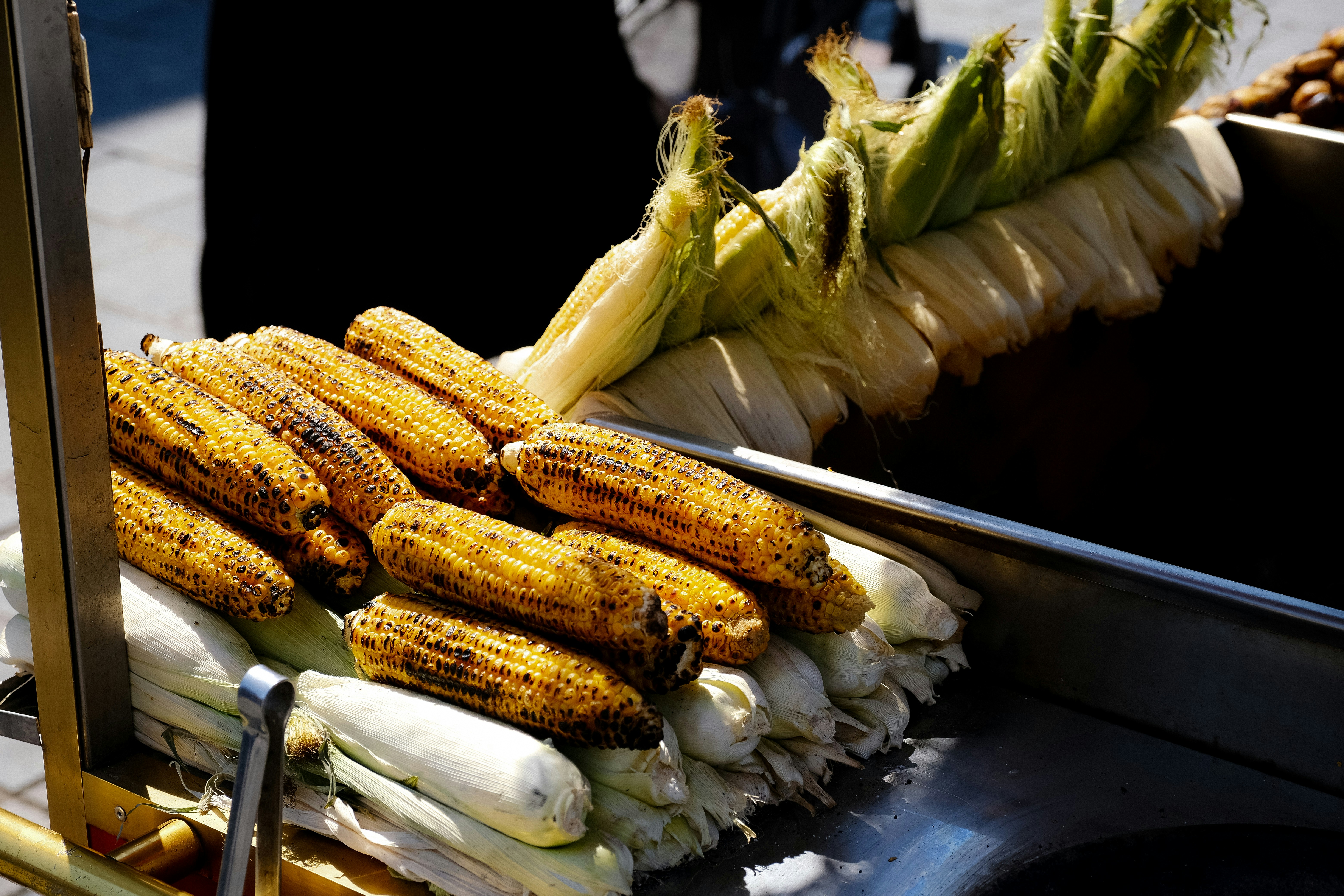 Golden Cob Parade: Freshly Grilled Corn at a Street Stall