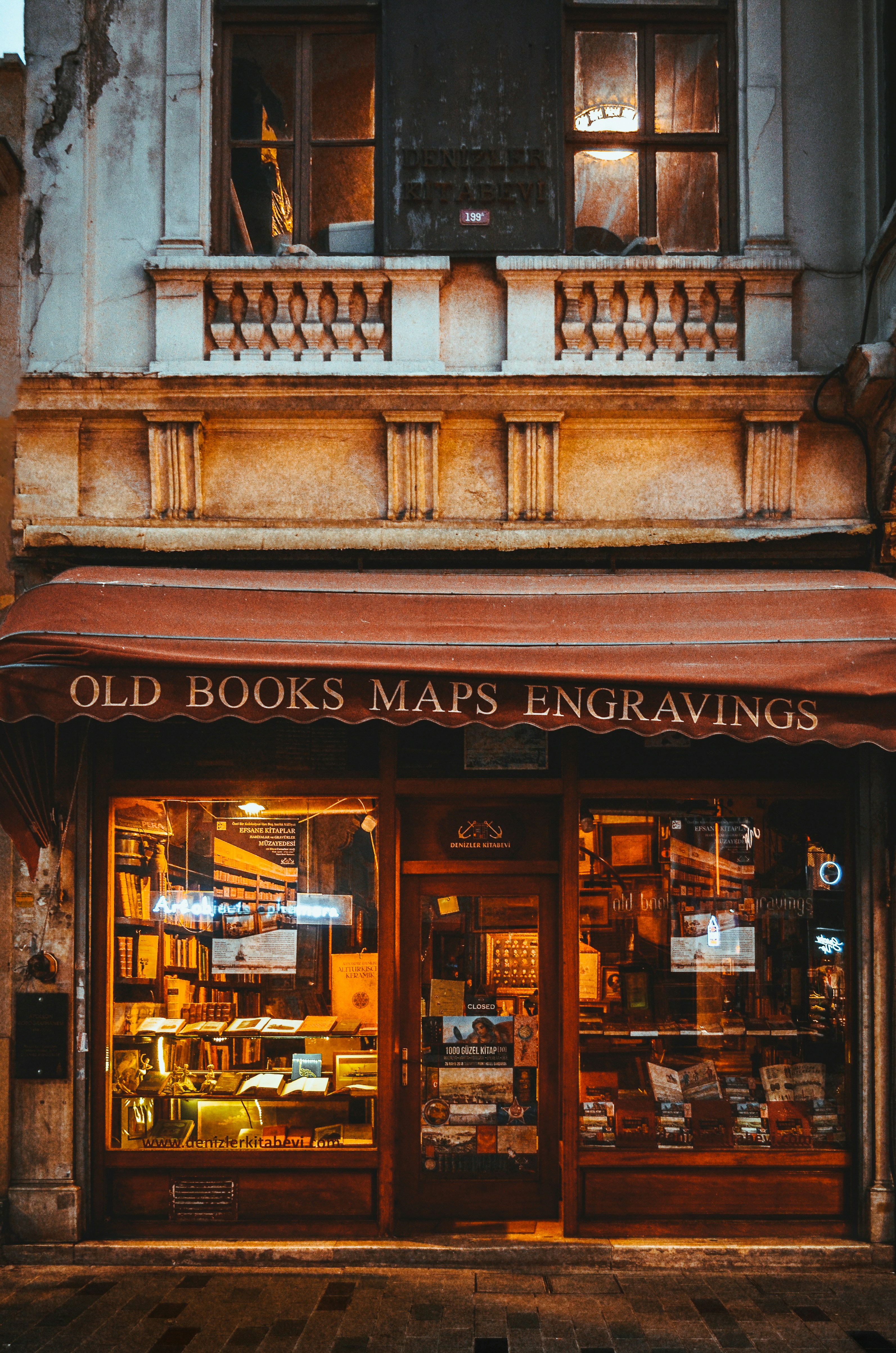 Amber Glow at the Old Bookseller: Warm Light on a Vintage Bookshop