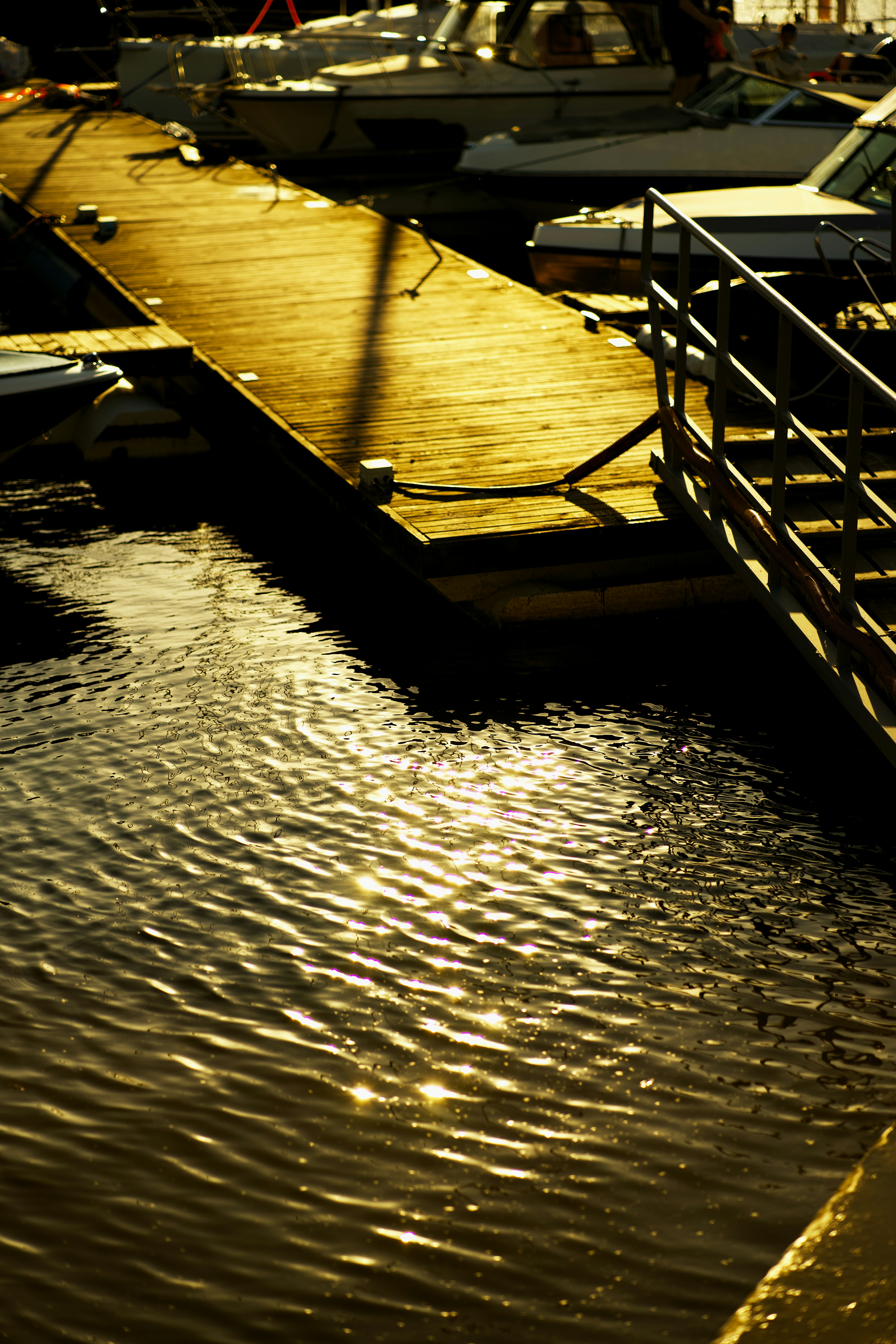 boats docked at a pier