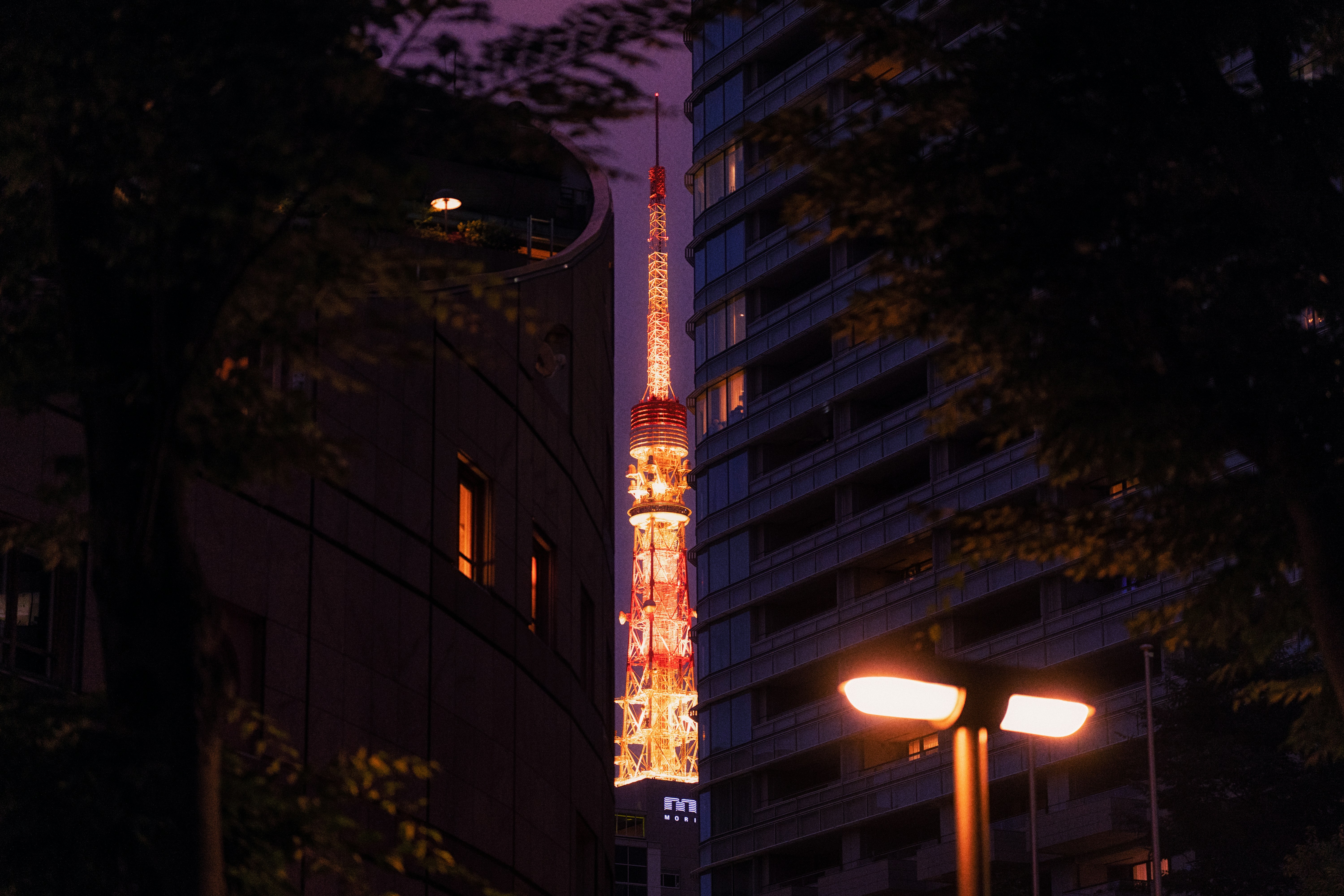a tall tower lit up at night