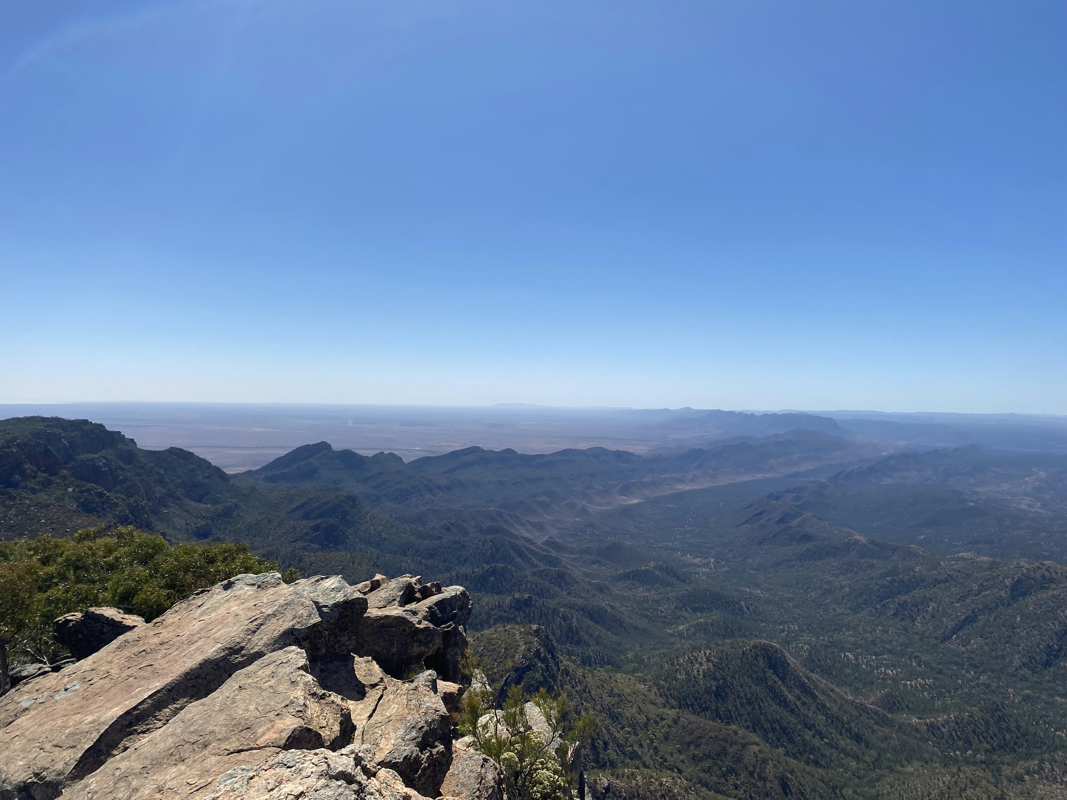 Ridgeline Outlook: A Clear Horizon Over Rolling Valleys
