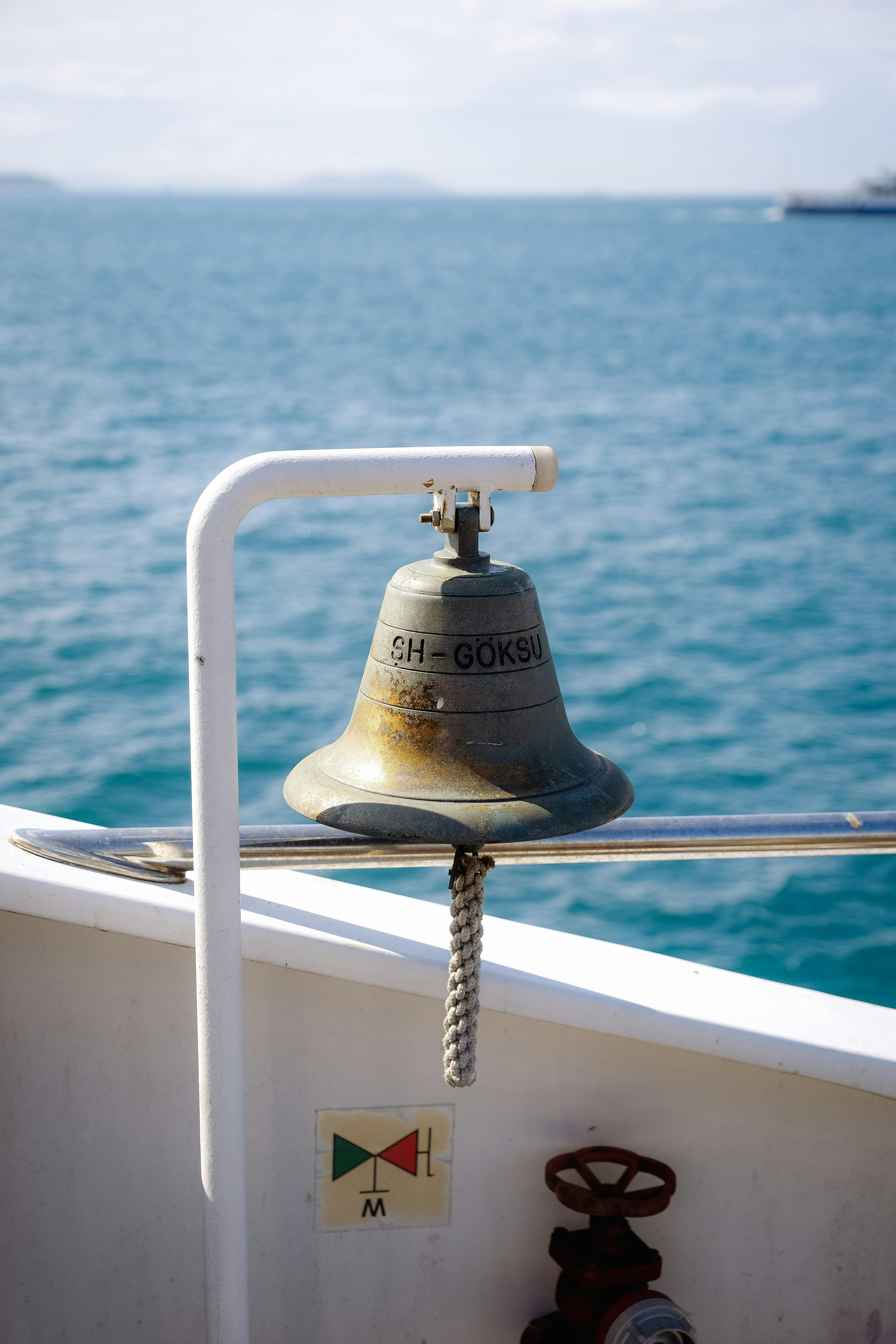 Harbor Bell on a Quiet Deck