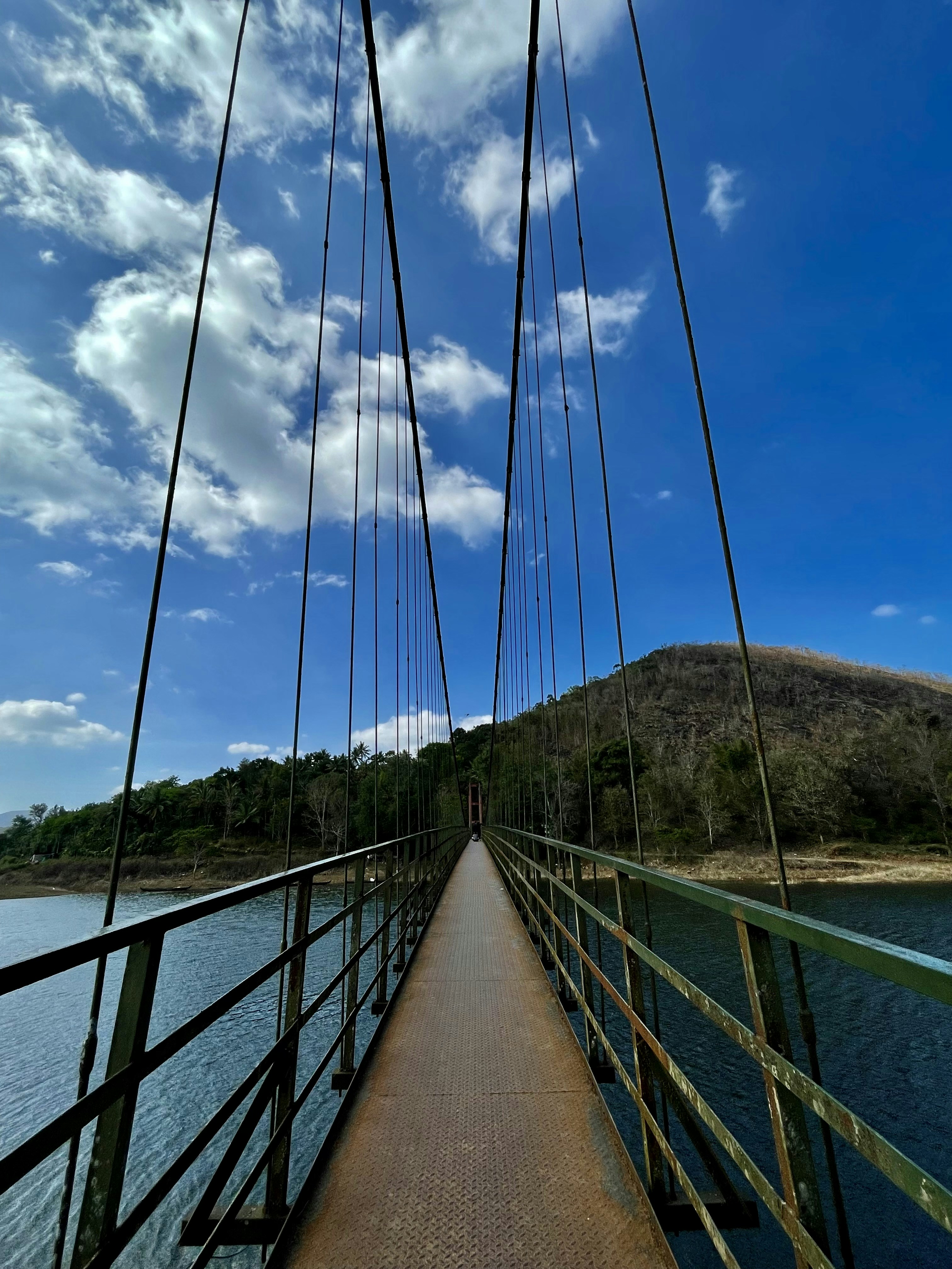 A bridge over a body of water photo – Free Blue Image on Unsplash