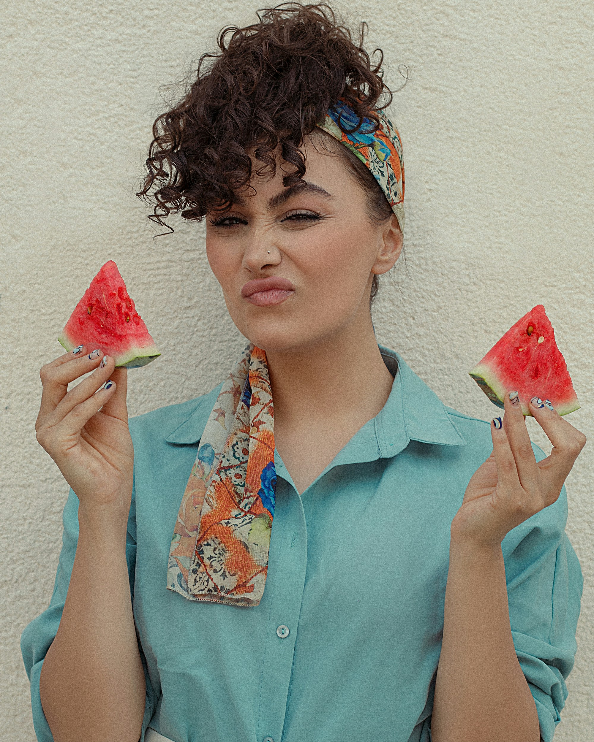Watermelon Wedges and a Wry Smile: A Teal Shirt Portrait