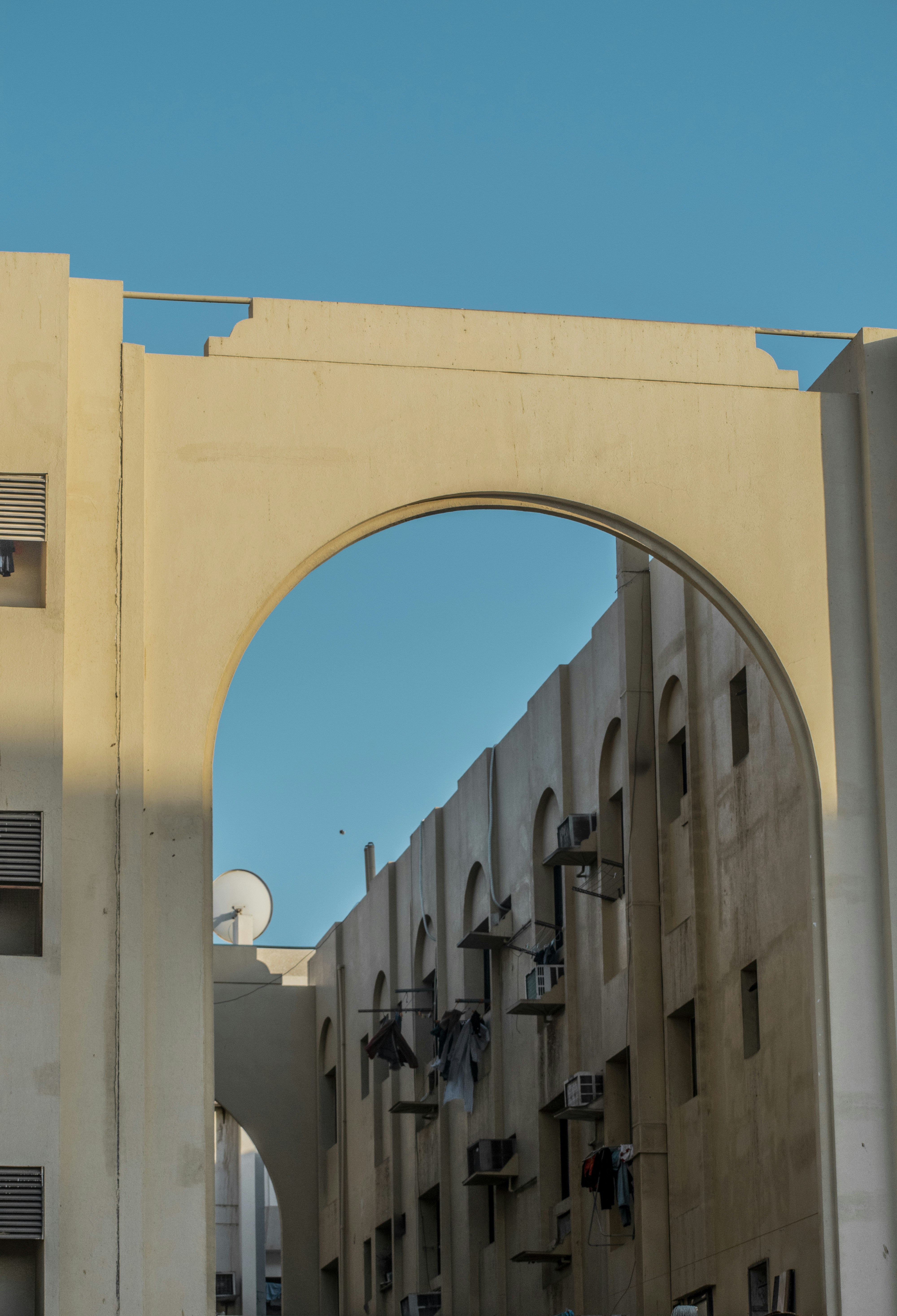 A large arched doorway with a stone arch photo – Free Dubai - united ...