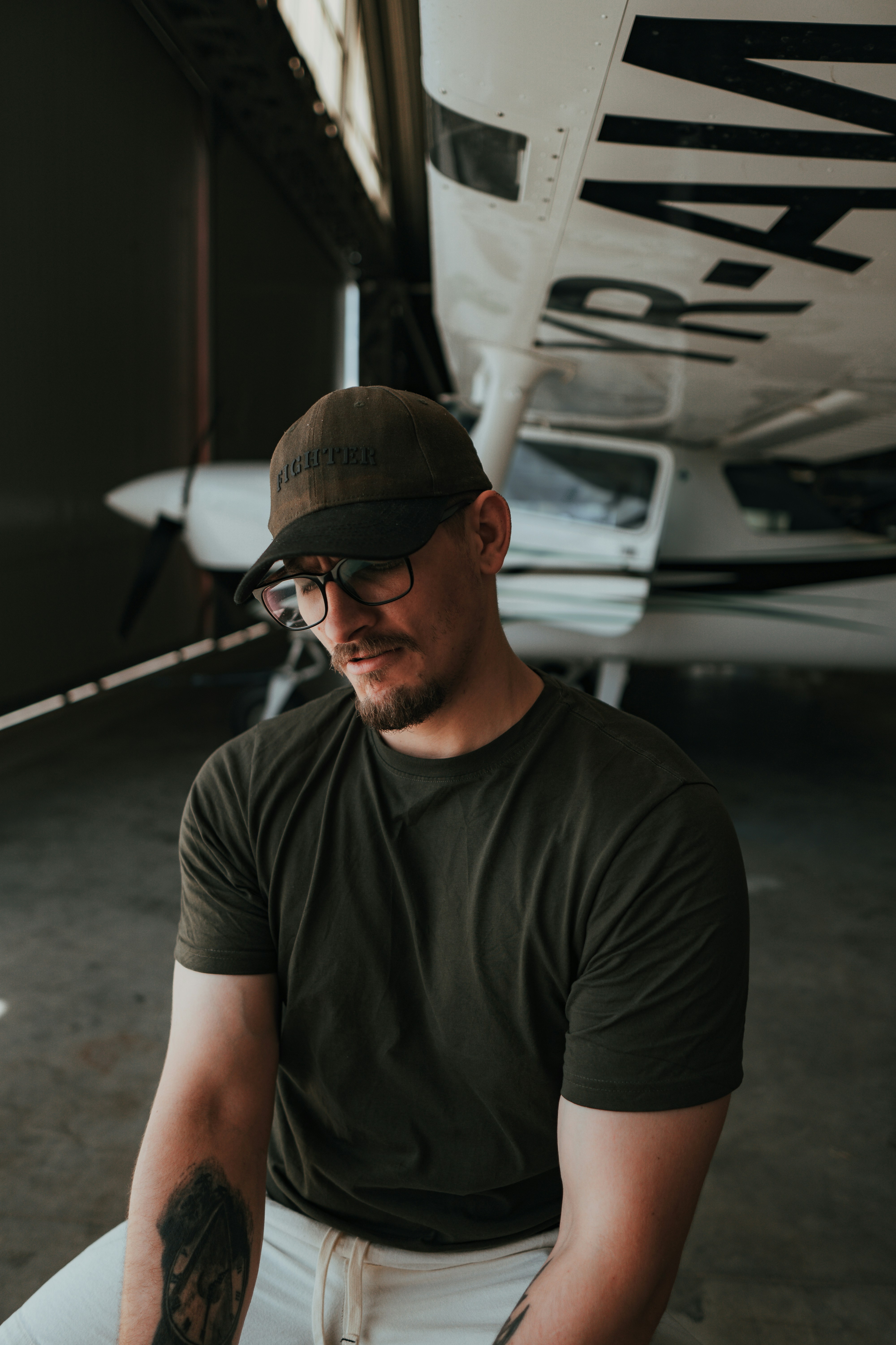 Grounded in Focus: A Portrait Beneath the Wings