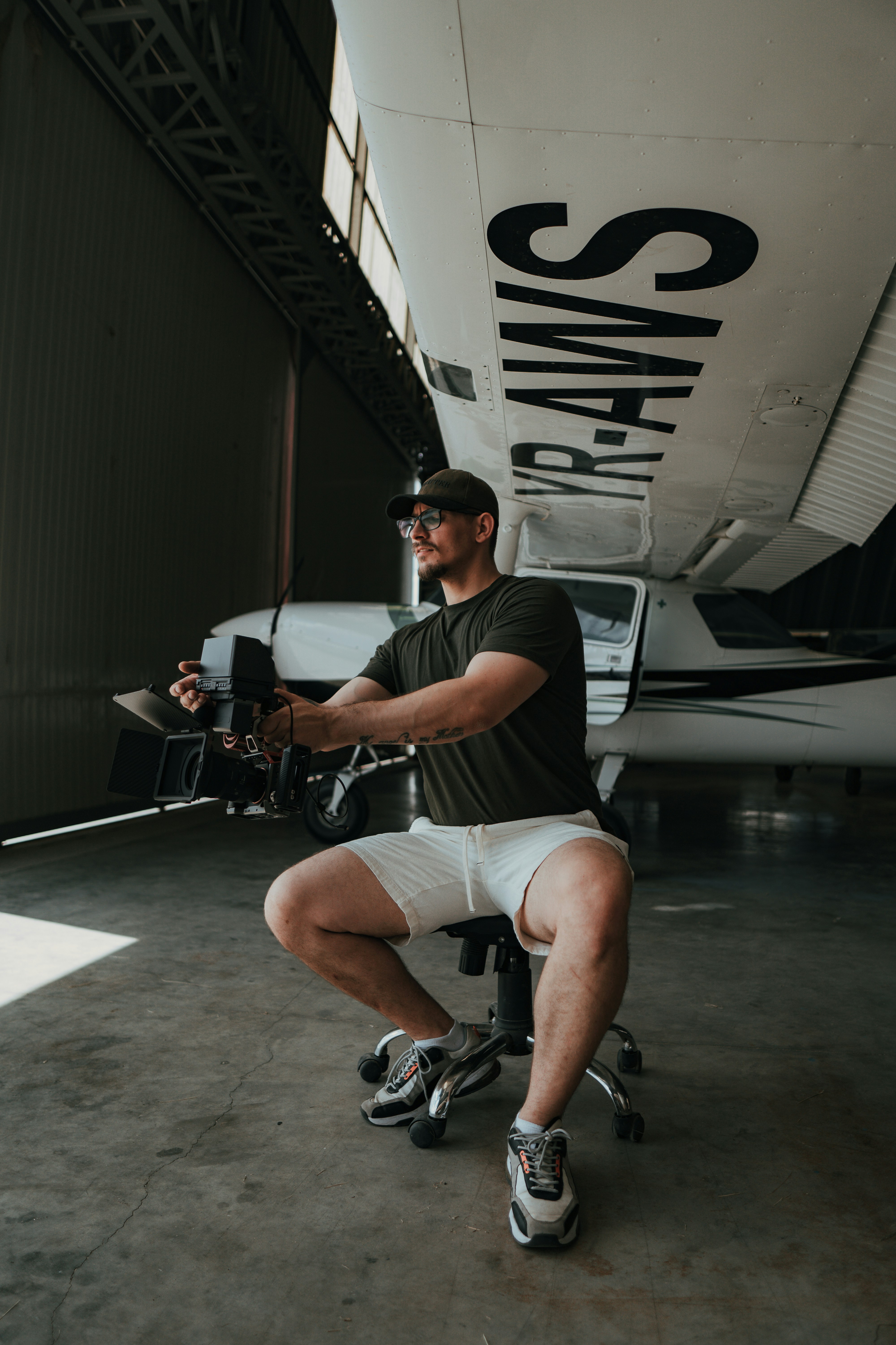 Pilot in the Hangar: Focused on the Creator Operating a Drone Rig
