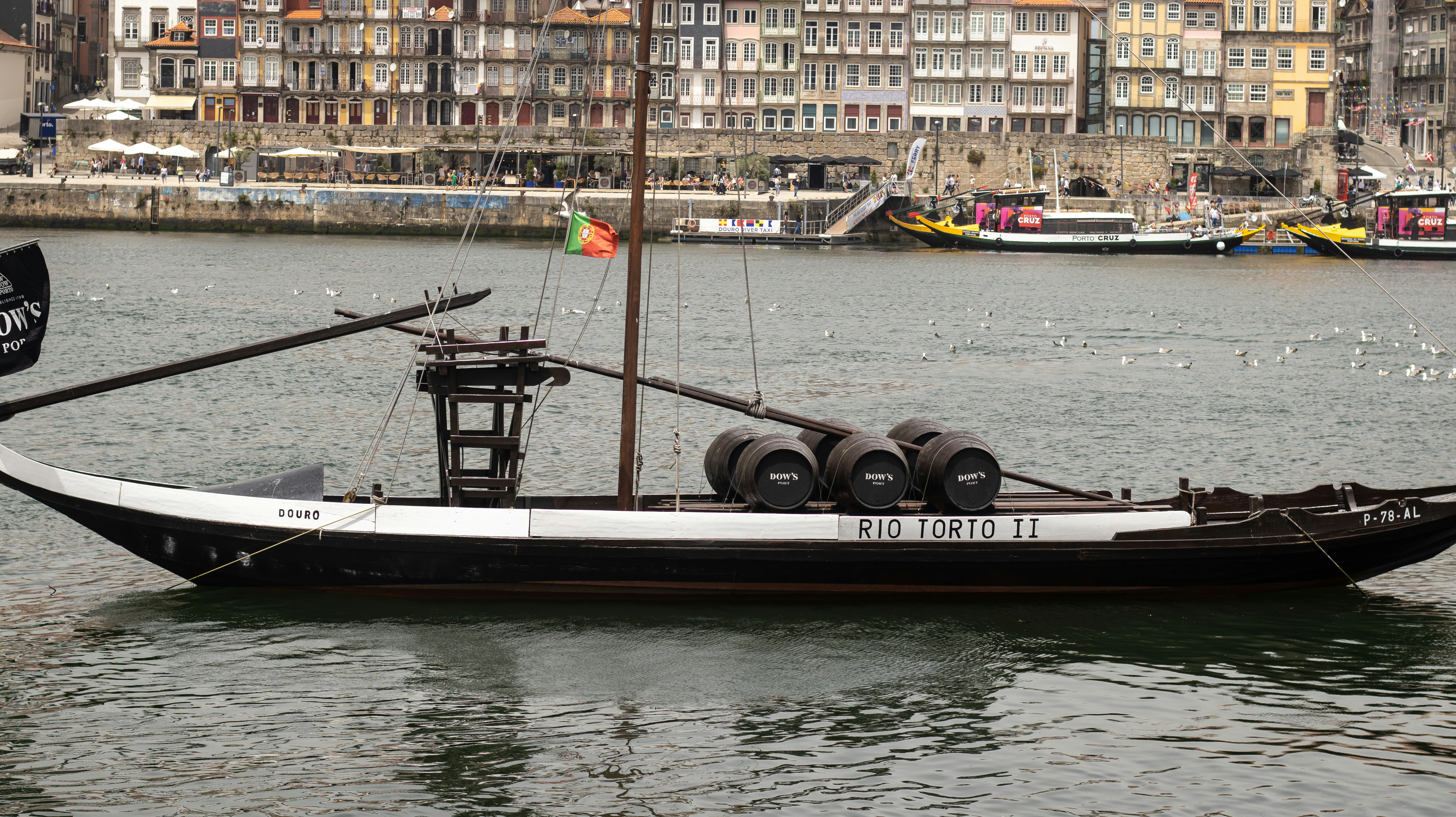 Low-profile Boat Steady on Lisbon Waterfront