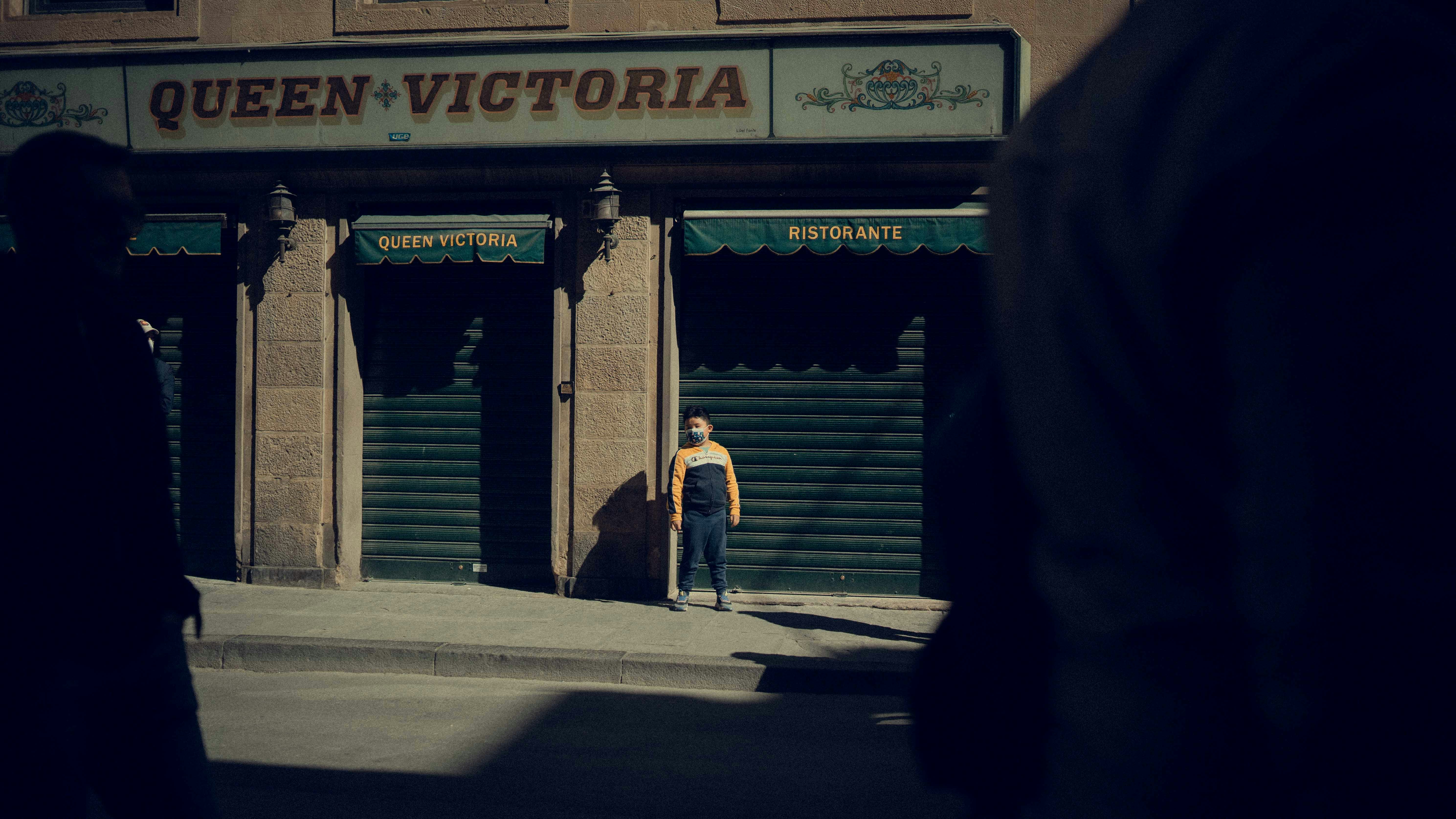 A person walking out of a building photo – Free Florenz Image on Unsplash